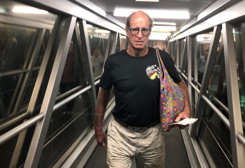 James Ricketson flies home to Sydney after more than a year in ...