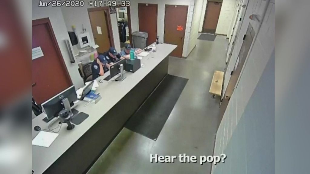 Surveillance video shows Officer Austin Hopp and two other officers ...