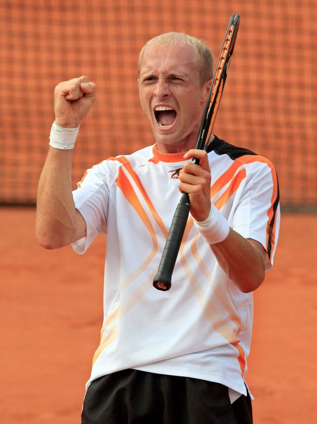 Davydenko safely into Halle second round - ABC News