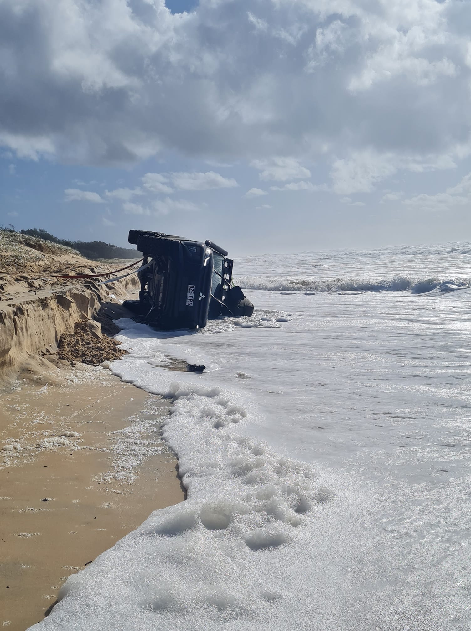 11 four-wheel drives pulled from sand along notorious Queensland beach ...