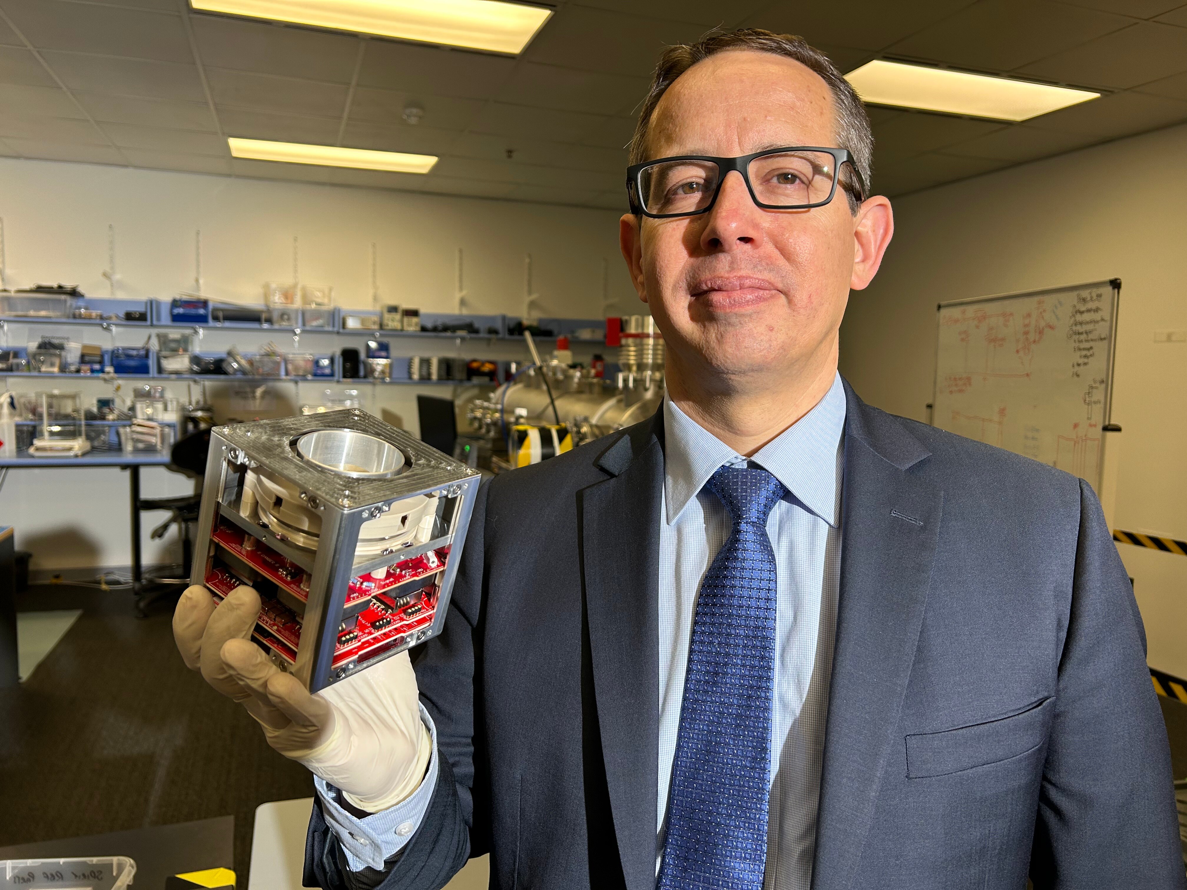 Space junk is causing clutter around the Earth, but a small cube could ...