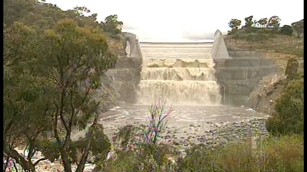 Authorities release water from full dam - ABC News