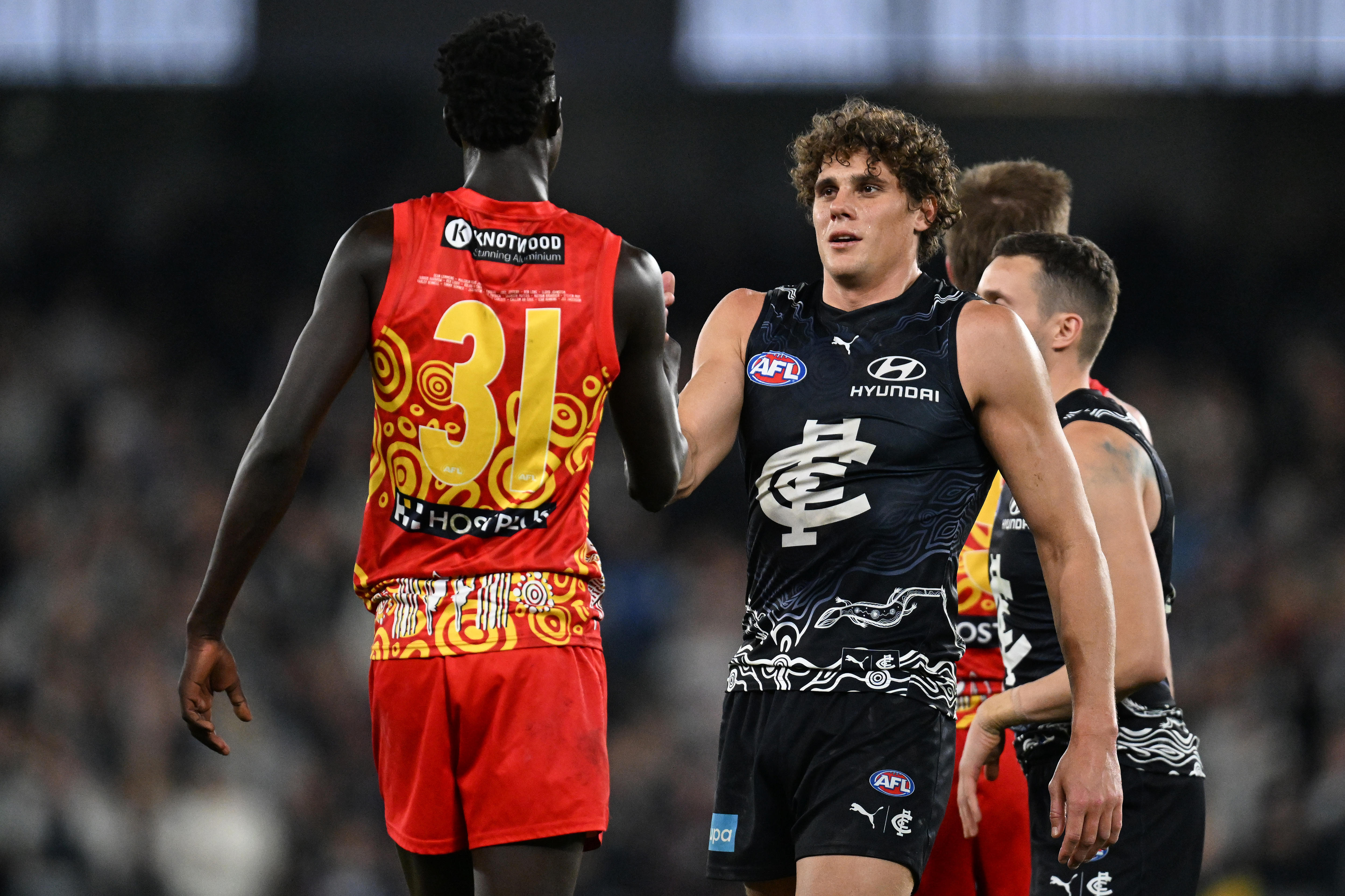 AFL Round-Up: Swans show no signs of slowing down, Cats stumble again ...