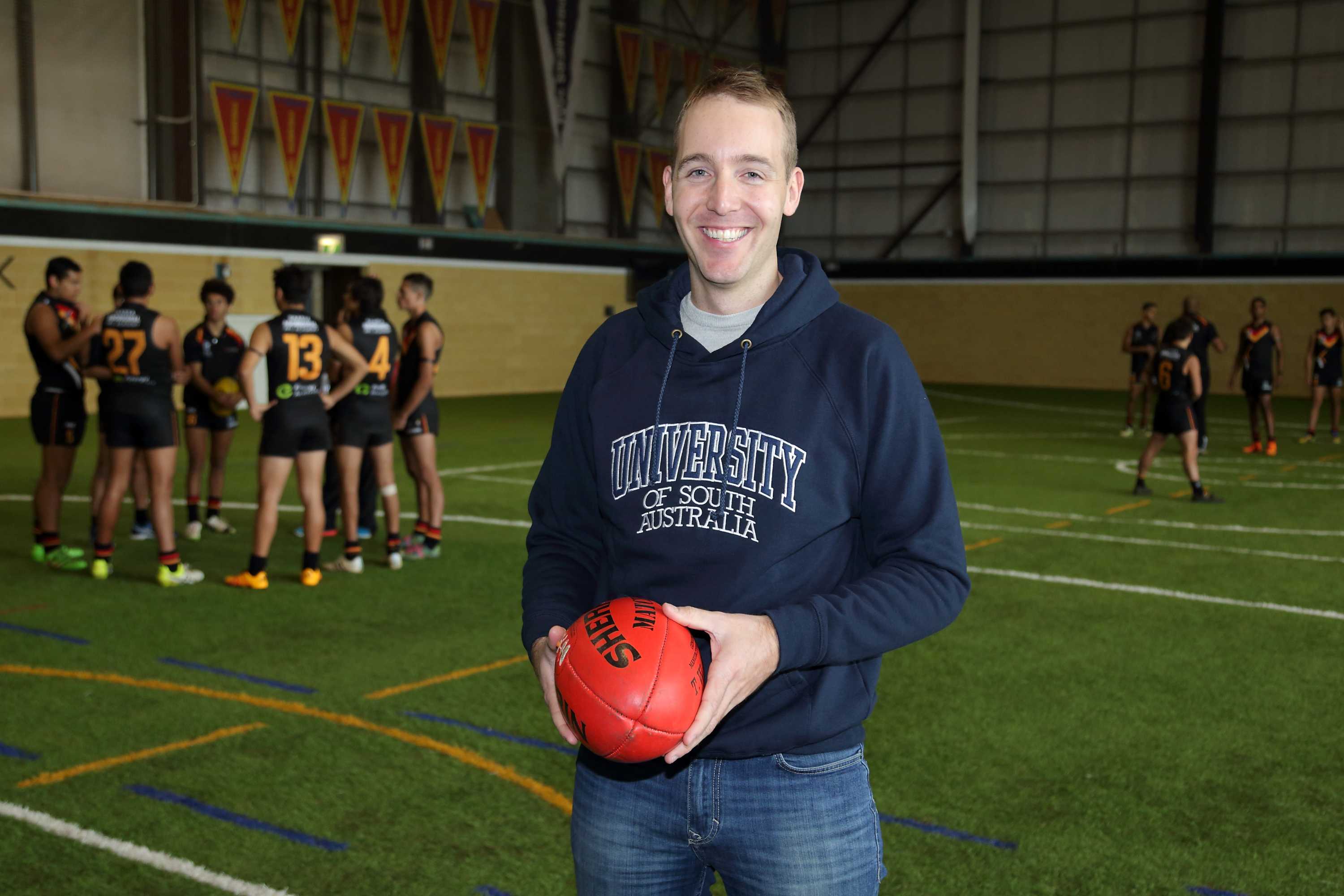 Meet the footy fan helping the Chinese understand Australia's game ...