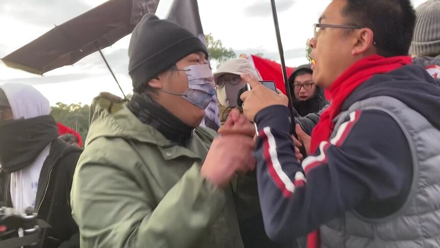 Scuffles between rival protesters at Parliament House amid Chinese ... Scuffles between rival protesters at Parliament House amid Chinese ...