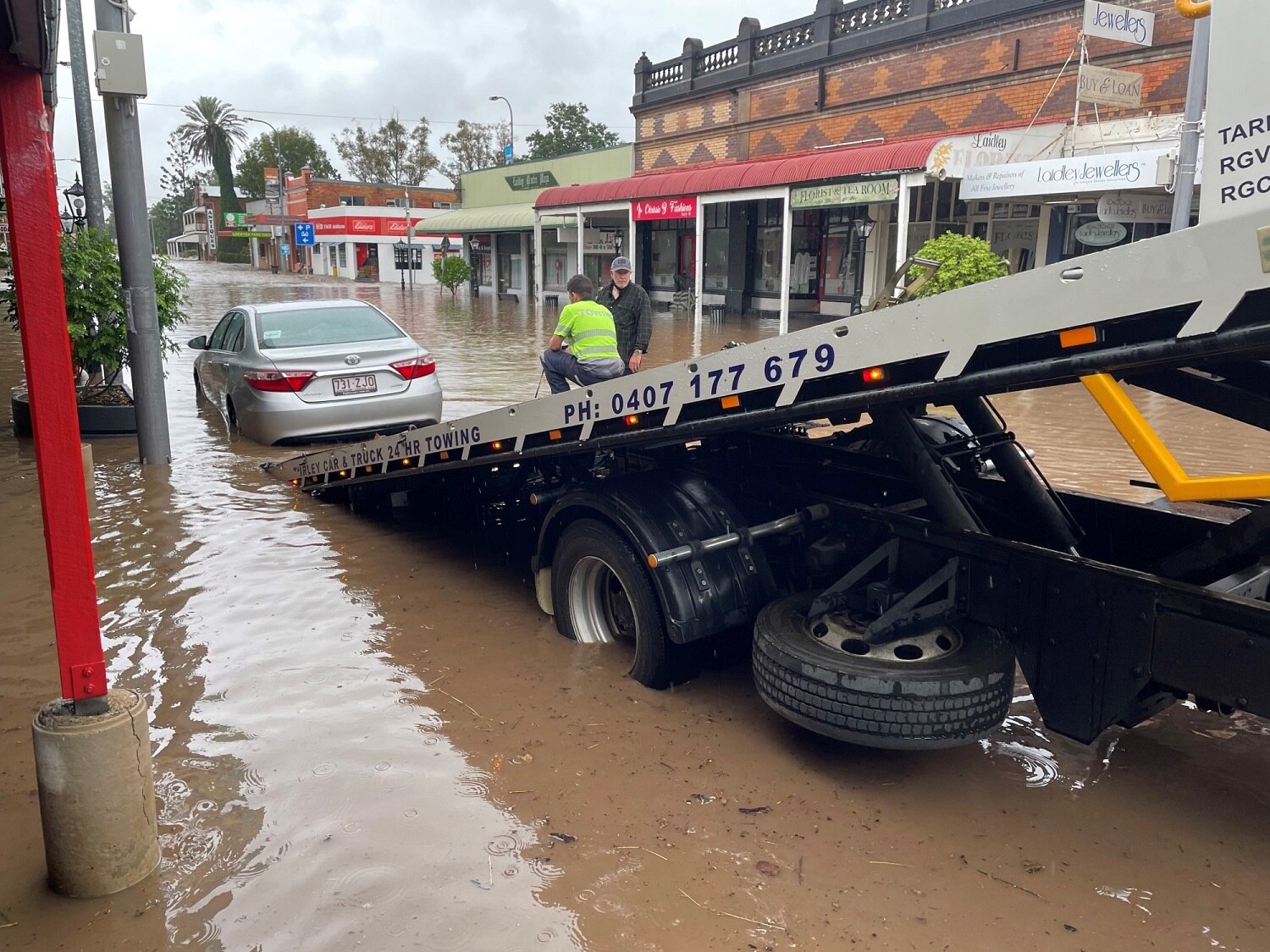 Queensland flooding fears as severe weather system brings heavy rain ...