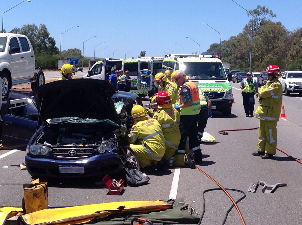 Two freed from wreckage after car and truck collide on Tonkin Highway ...