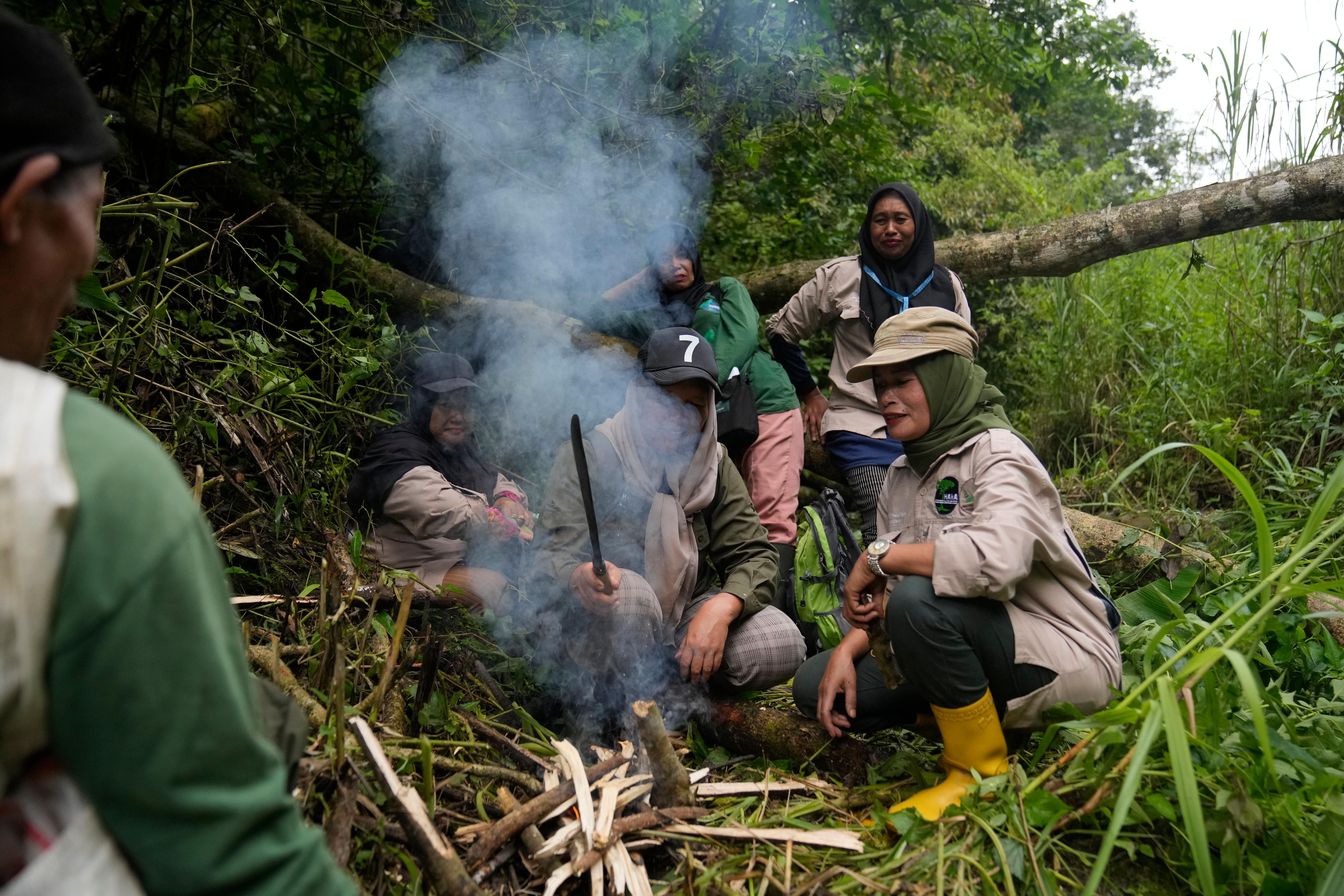 In Indonesia, women ranger teams go on patrol to slow deforestation ...