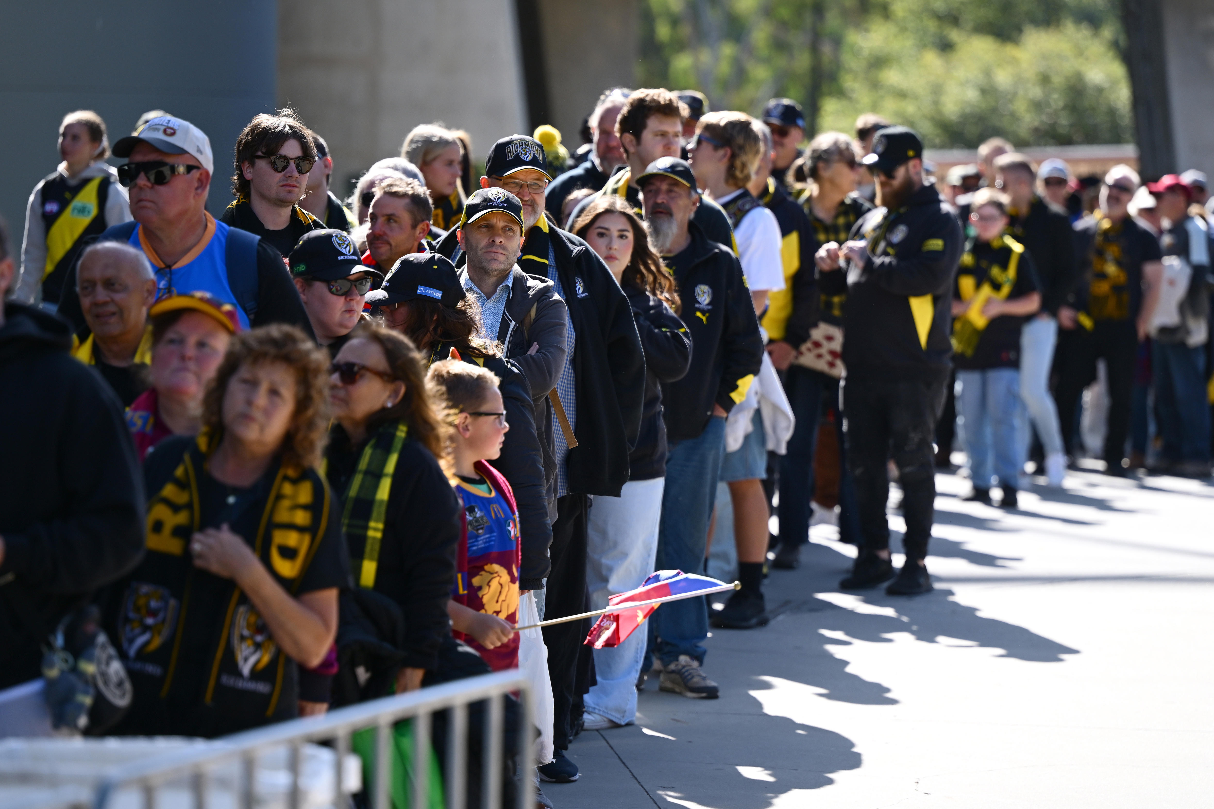 Tigers and Lions fans forced to wait in long queues at the MCG after ...