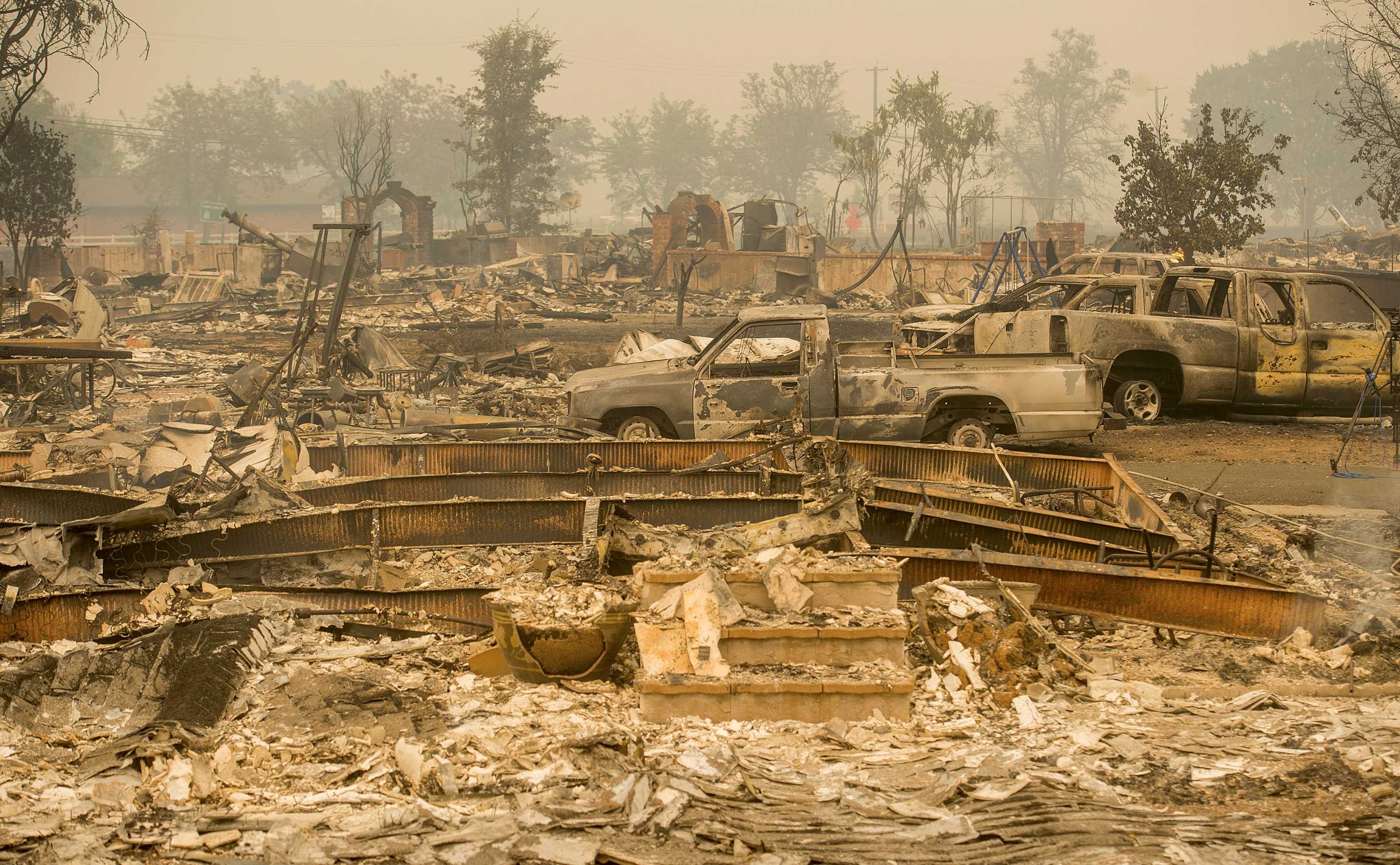 California wildfire: Hundreds of structures destroyed, thousands ...