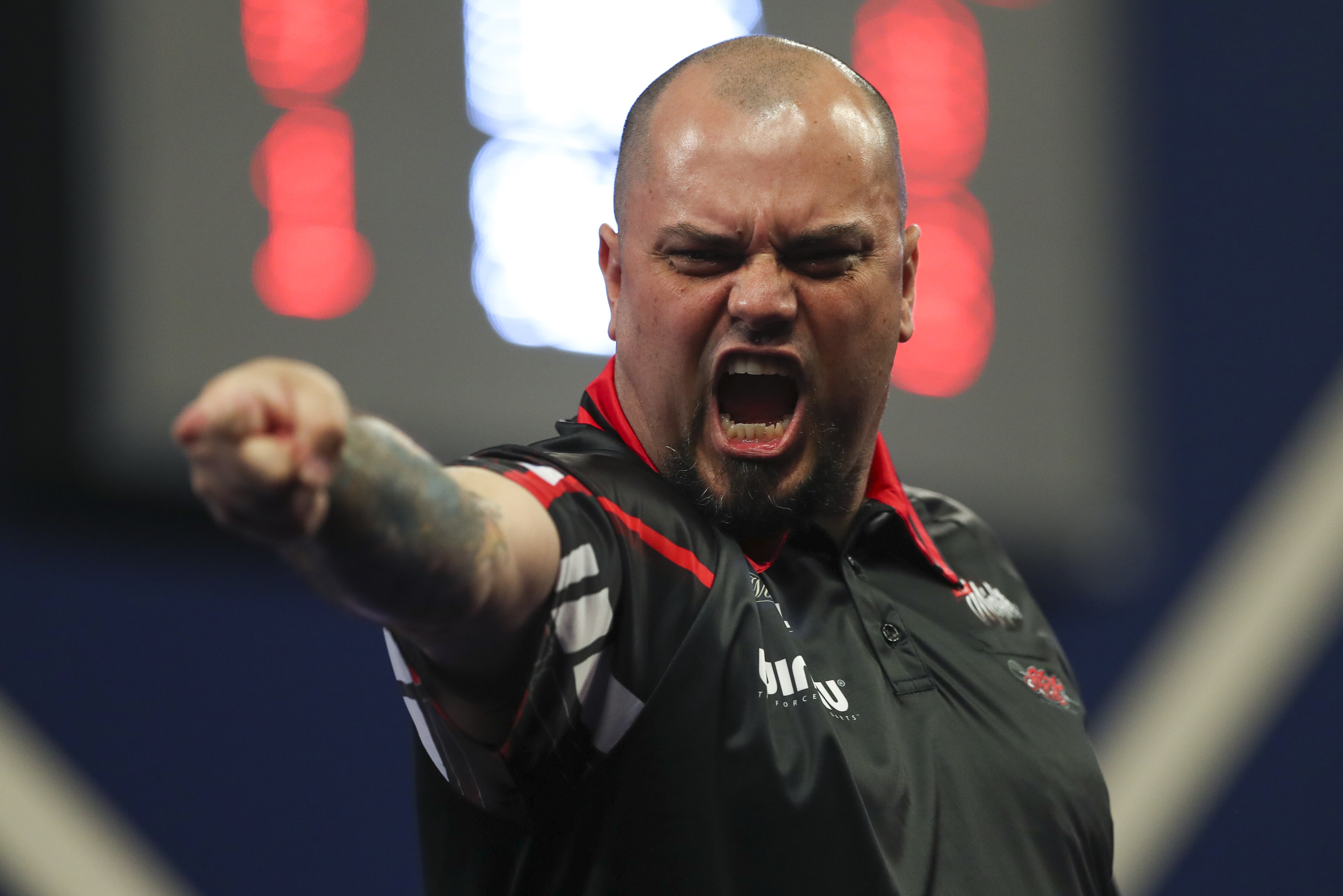 Aussie darts dad through to next round of world championships, awaits ...