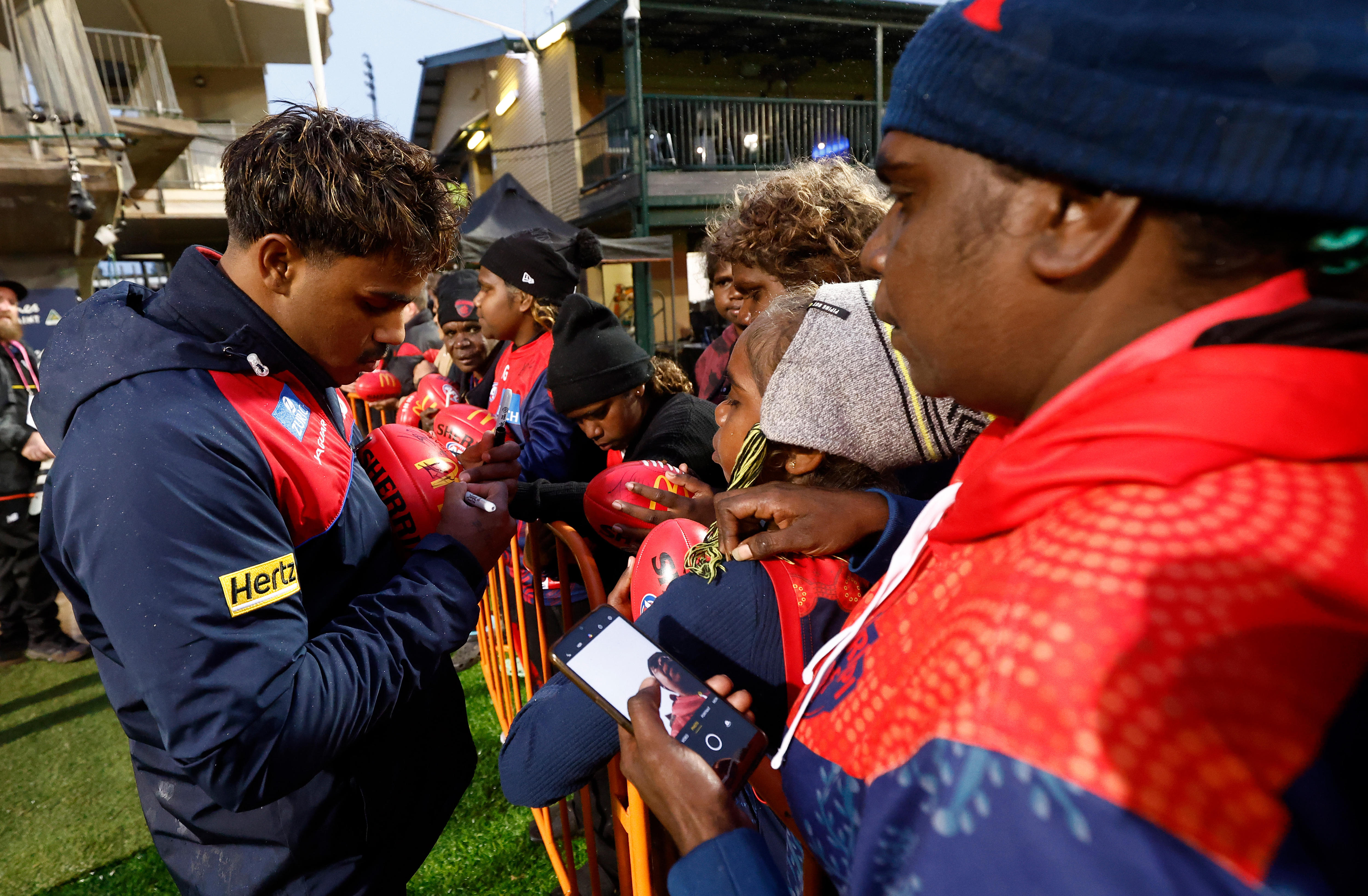 Fans gather in Alice Springs for annual Melbourne Demons match, after ...