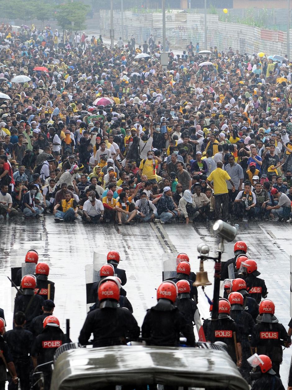 Hundreds arrested in Kuala Lumpur protests - ABC News