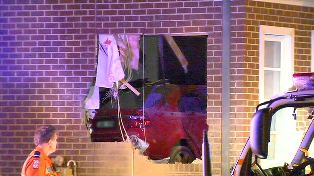 Point Cook couple finds car in lounge room after smash into home - ABC News