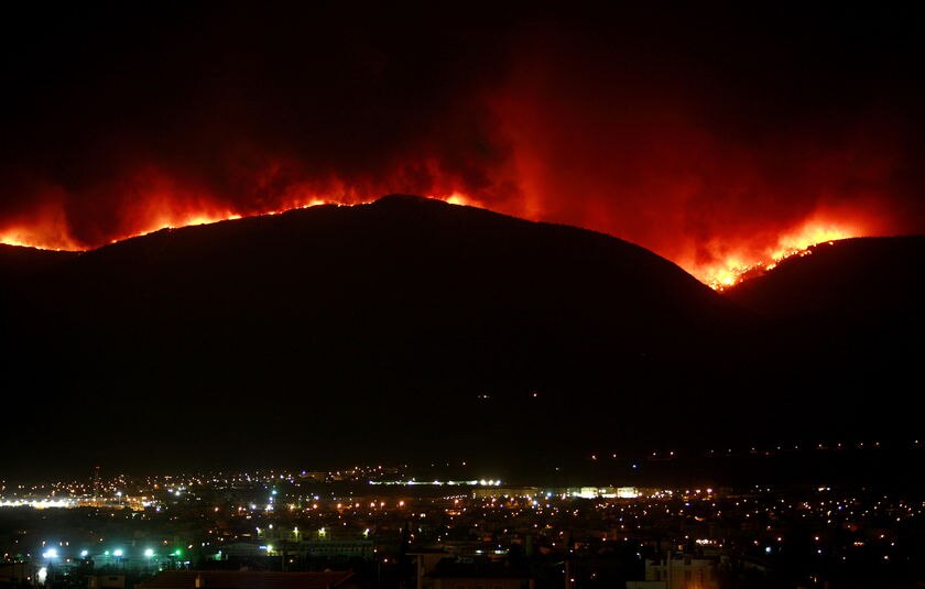 Two dead as fires rage across Greece - ABC News