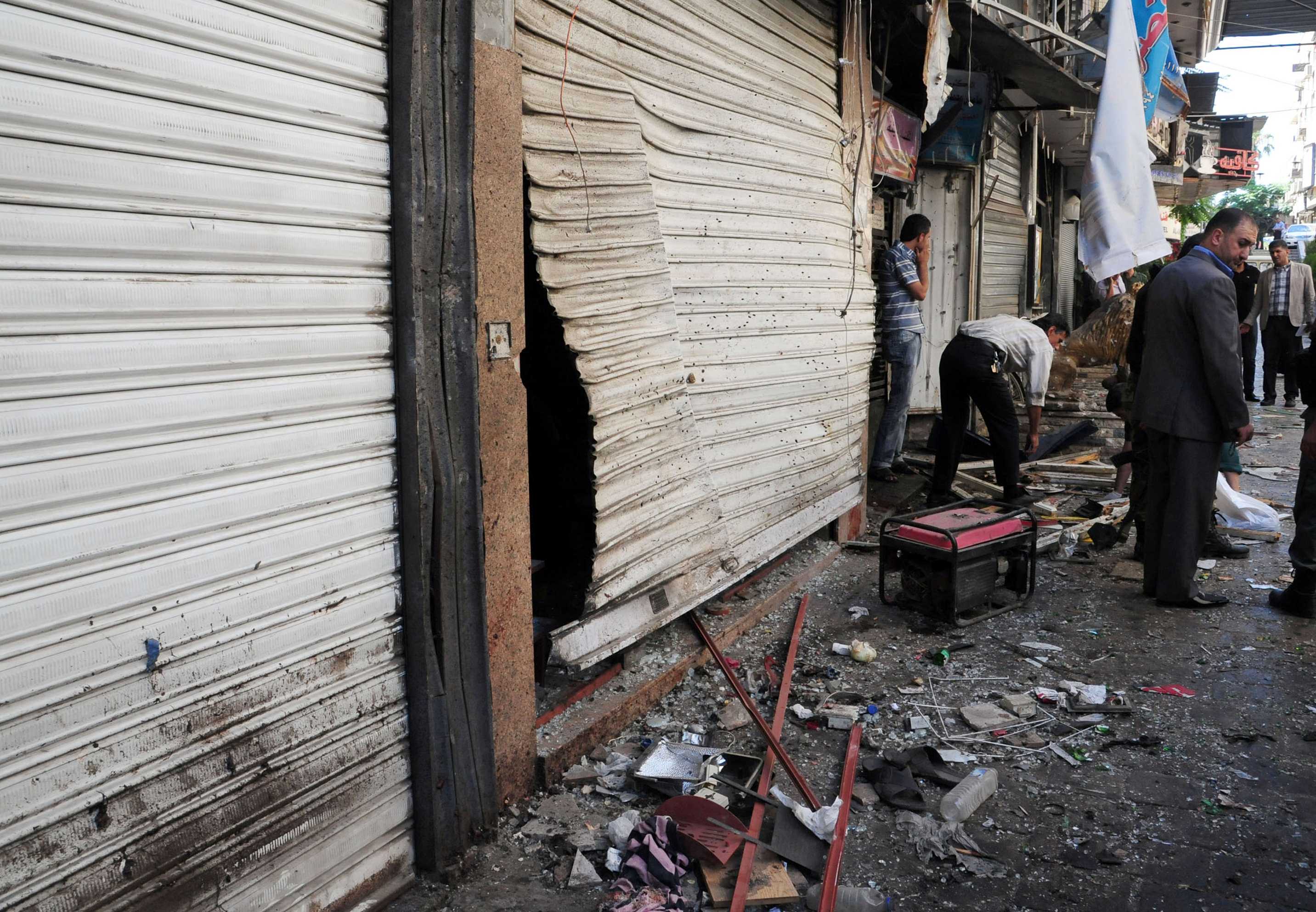 Damascus bomb blasts kill 14 near police station - ABC News