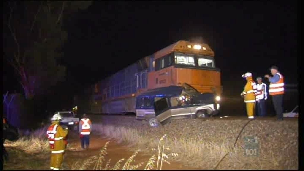 Car collides with train - ABC News