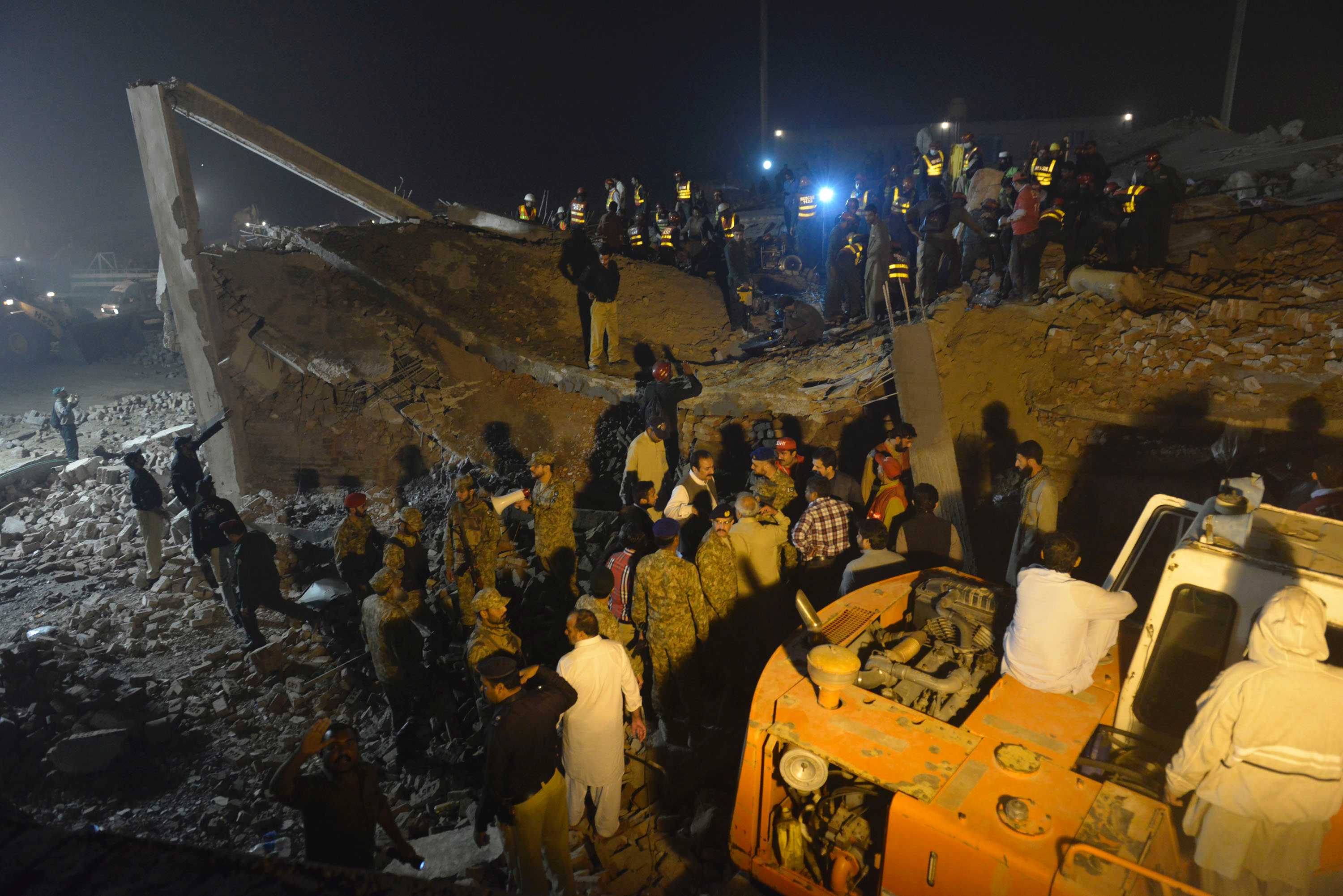 Pakistan factory collapse kills 18, dozens trapped in rubble - ABC News