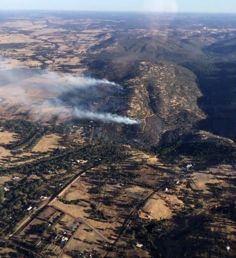Upper Swan bushfire contained, but threat remains to homes - ABC News