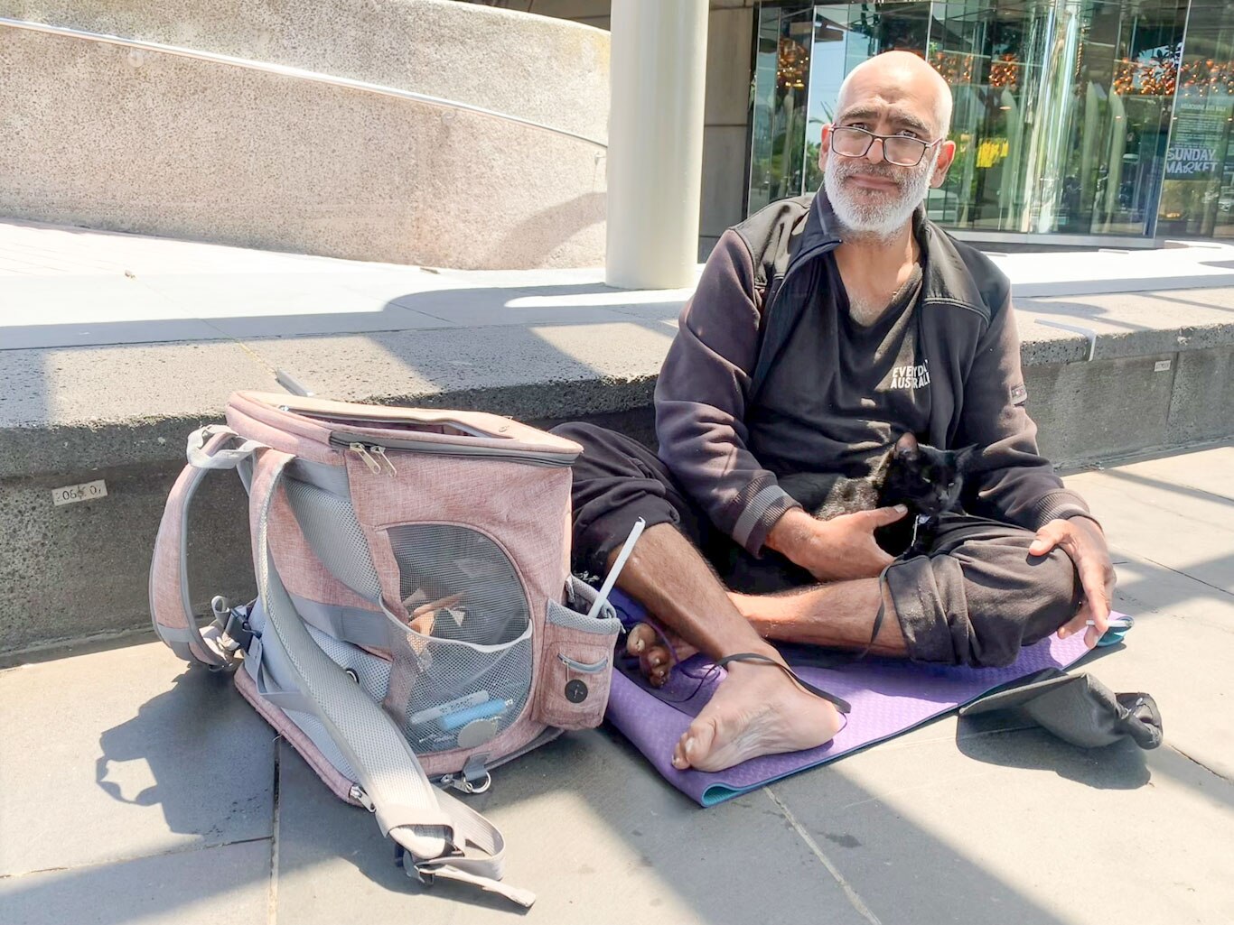 In an increasingly cashless society, some people without housing are ...