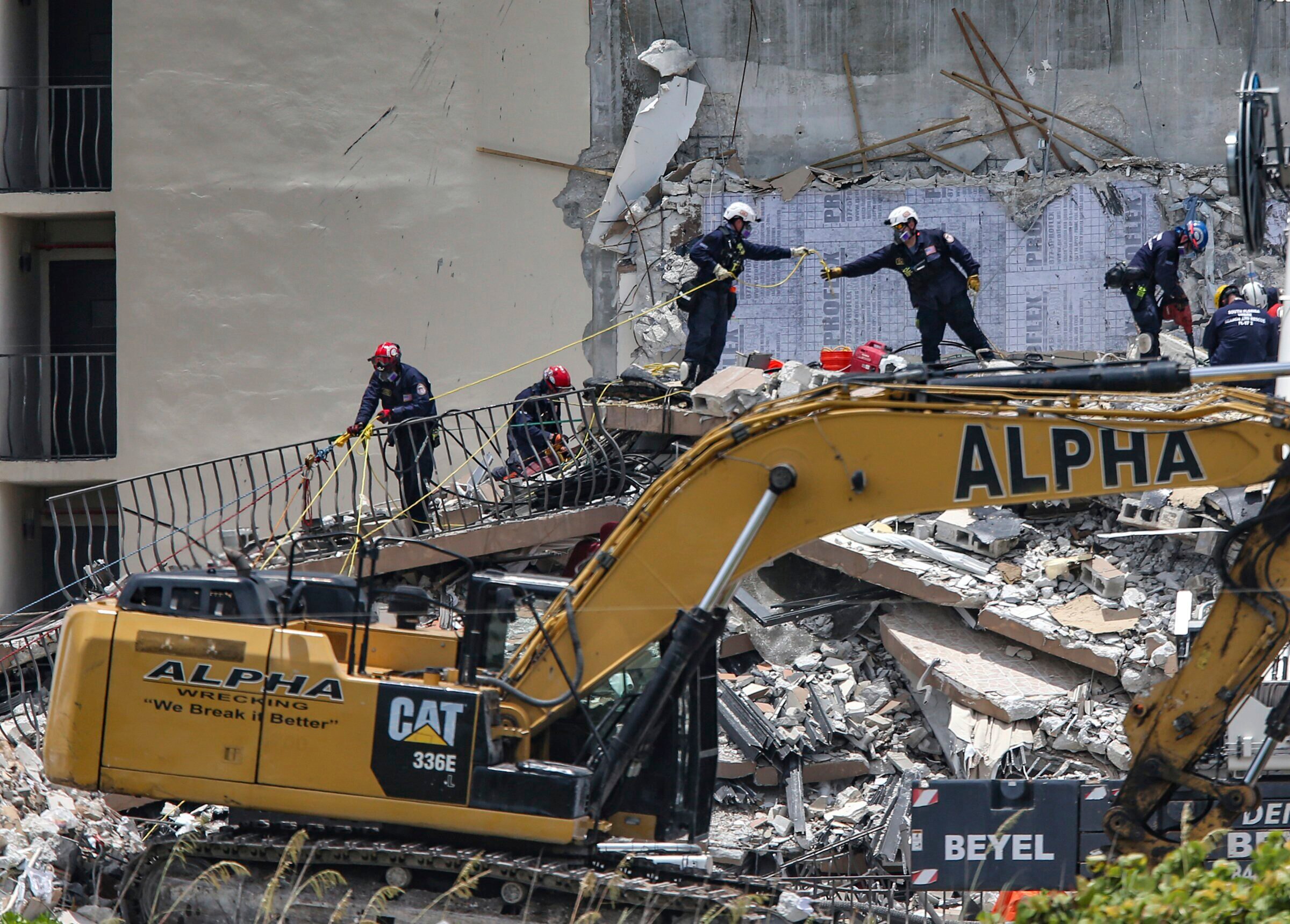 Miami apartment building collapse death toll rises to nine, rescuers ...
