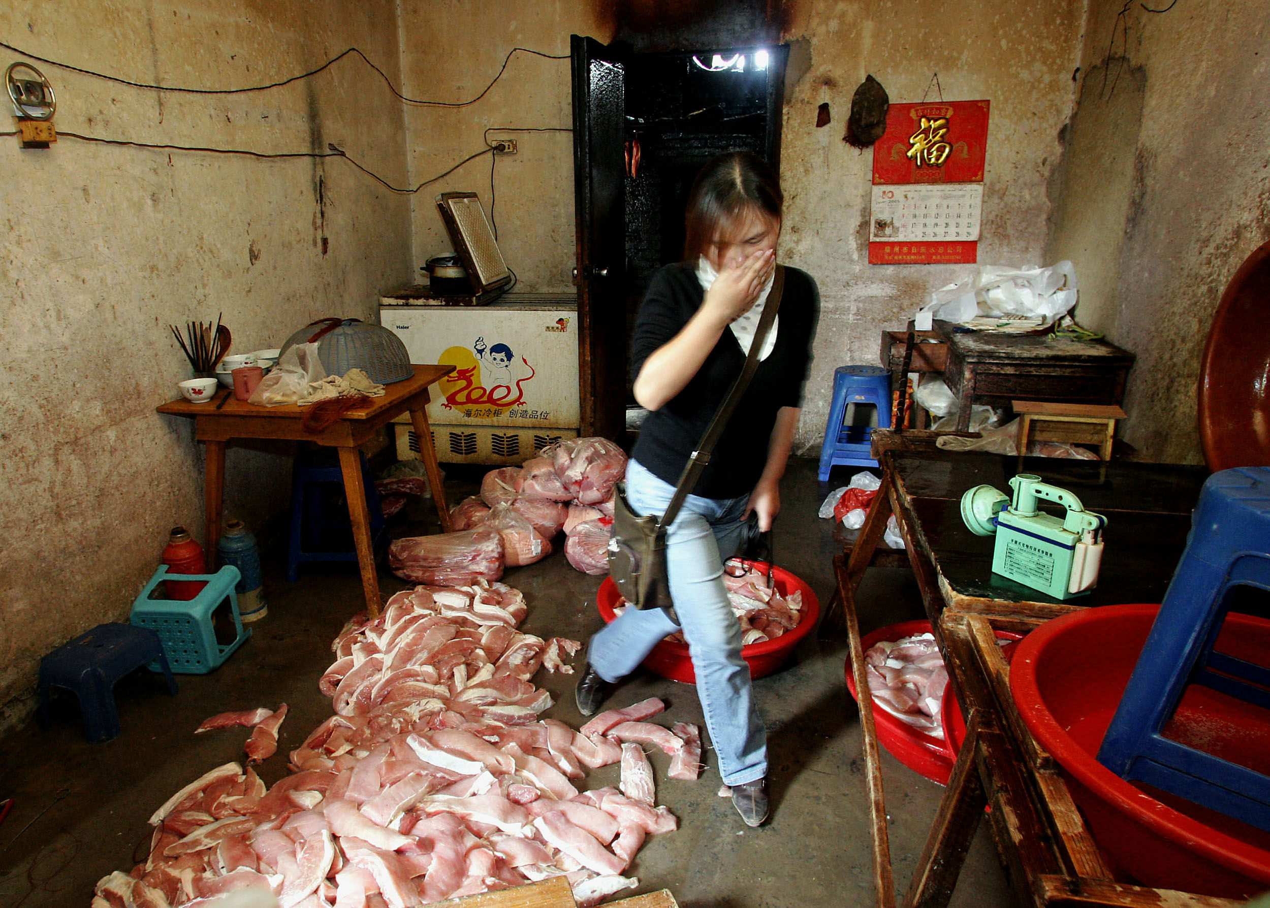 Decades-old rotting meat worth $500 million seized in China food ...