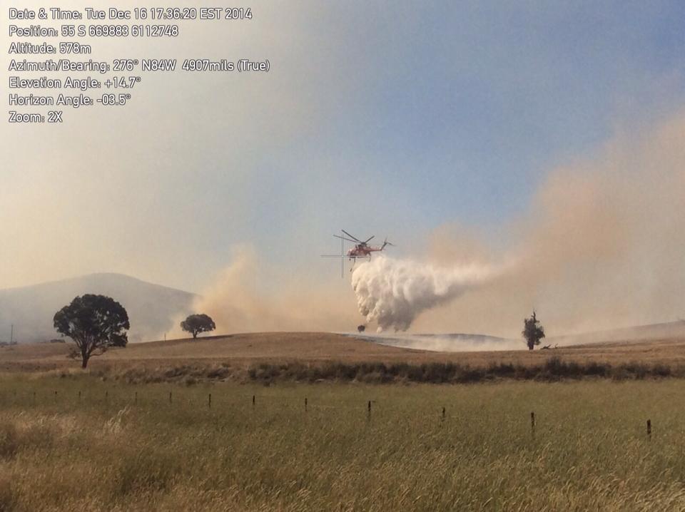 Remote grassland fire burning south of Yass sends smoke over Canberra ...