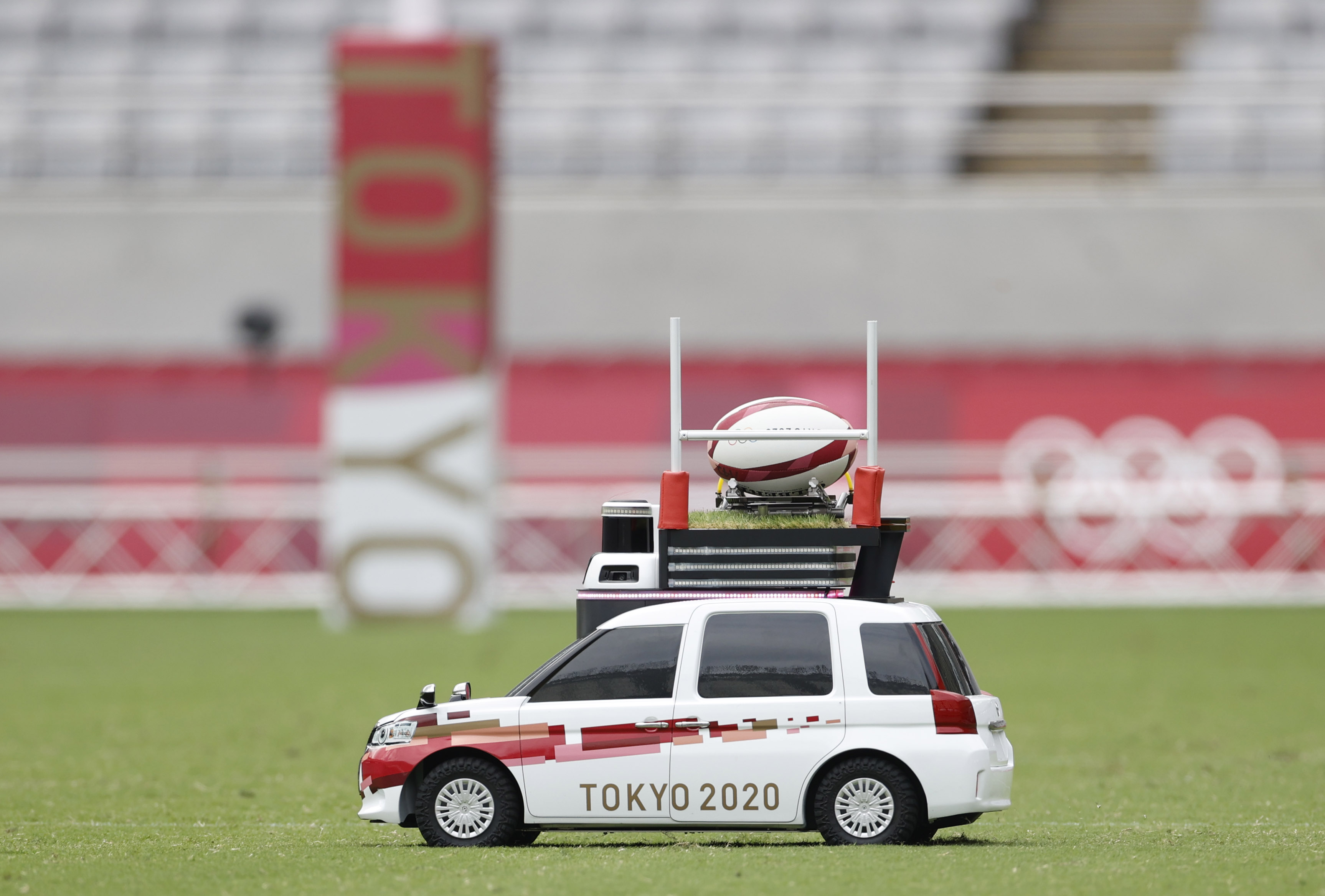 What are the little remote controlled cars on the field at the Olympics ...
