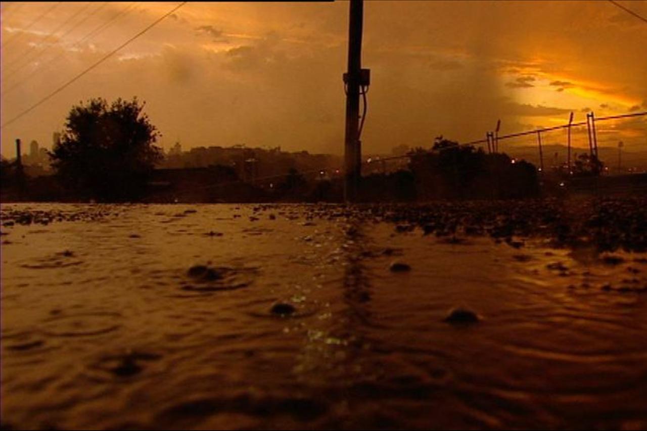 More rain predicted as storm drenches Brisbane - ABC News