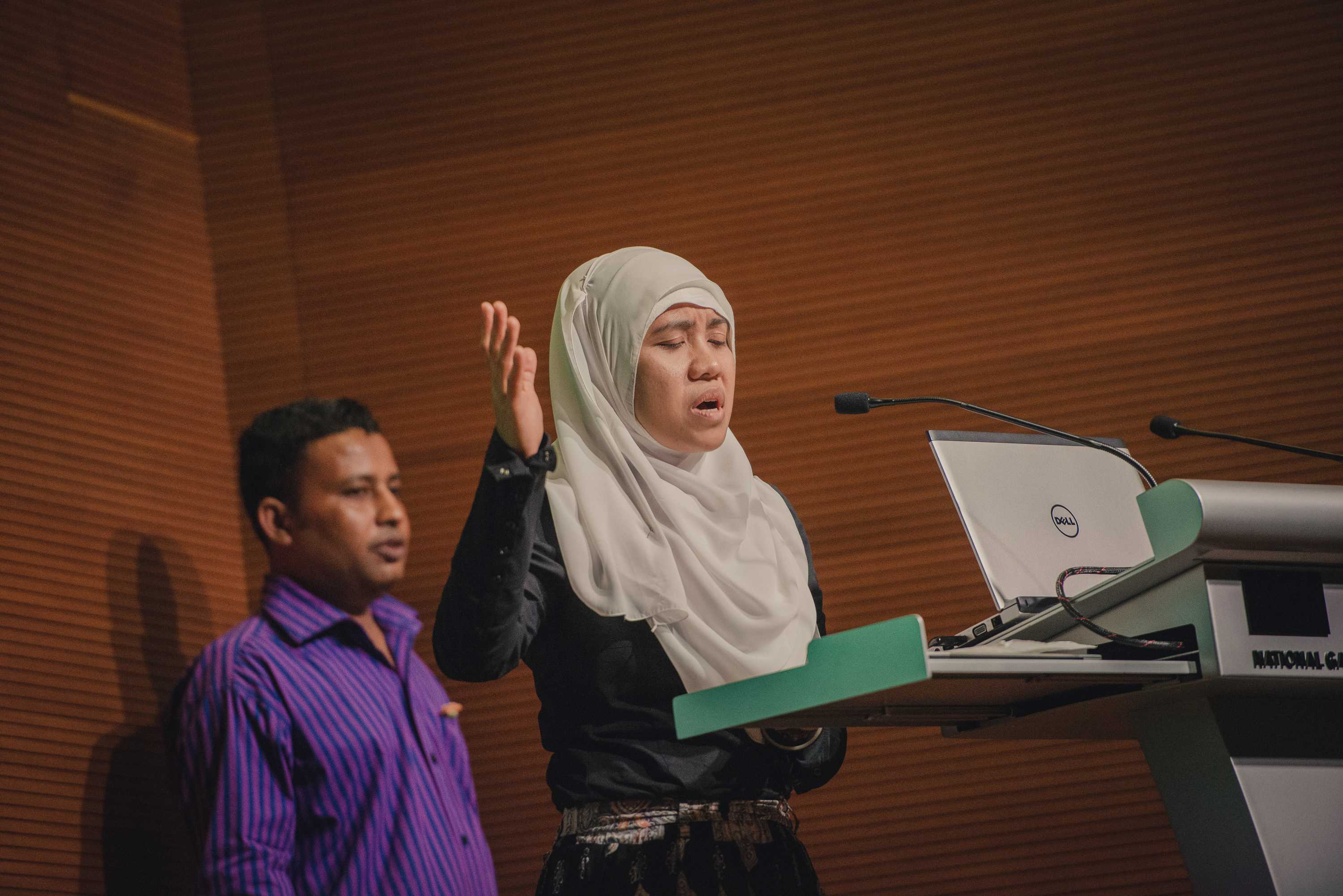 Migrant workers in Singapore reveal hidden poetry talents on stage - ABC News