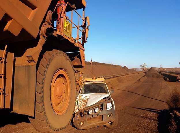 Rio Tinto reprimanded after mine haul truck hits 4WD, drags it 40 ...