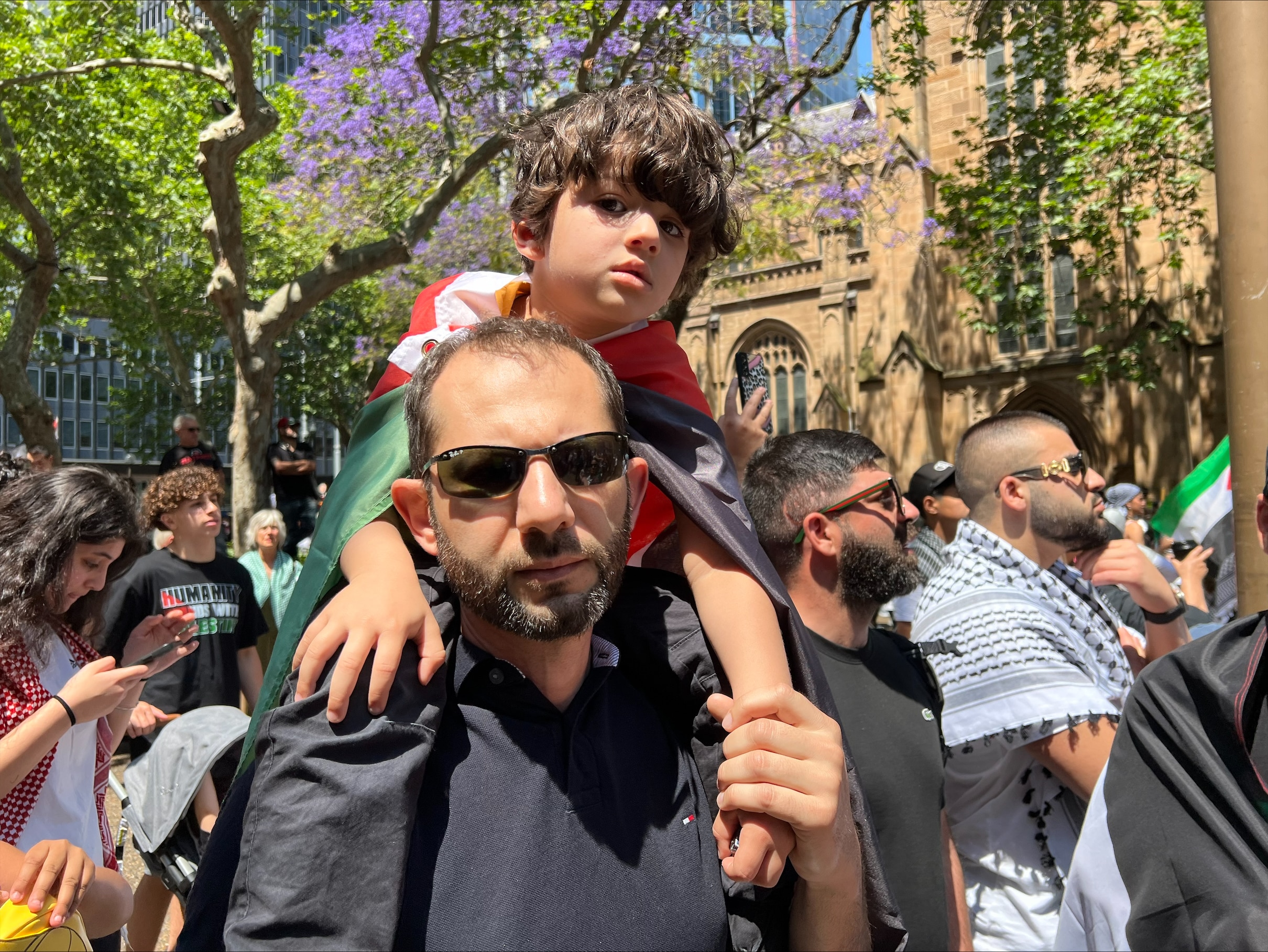 Colours of Palestinian flag fly over streets in Sydney, Brisbane and ...