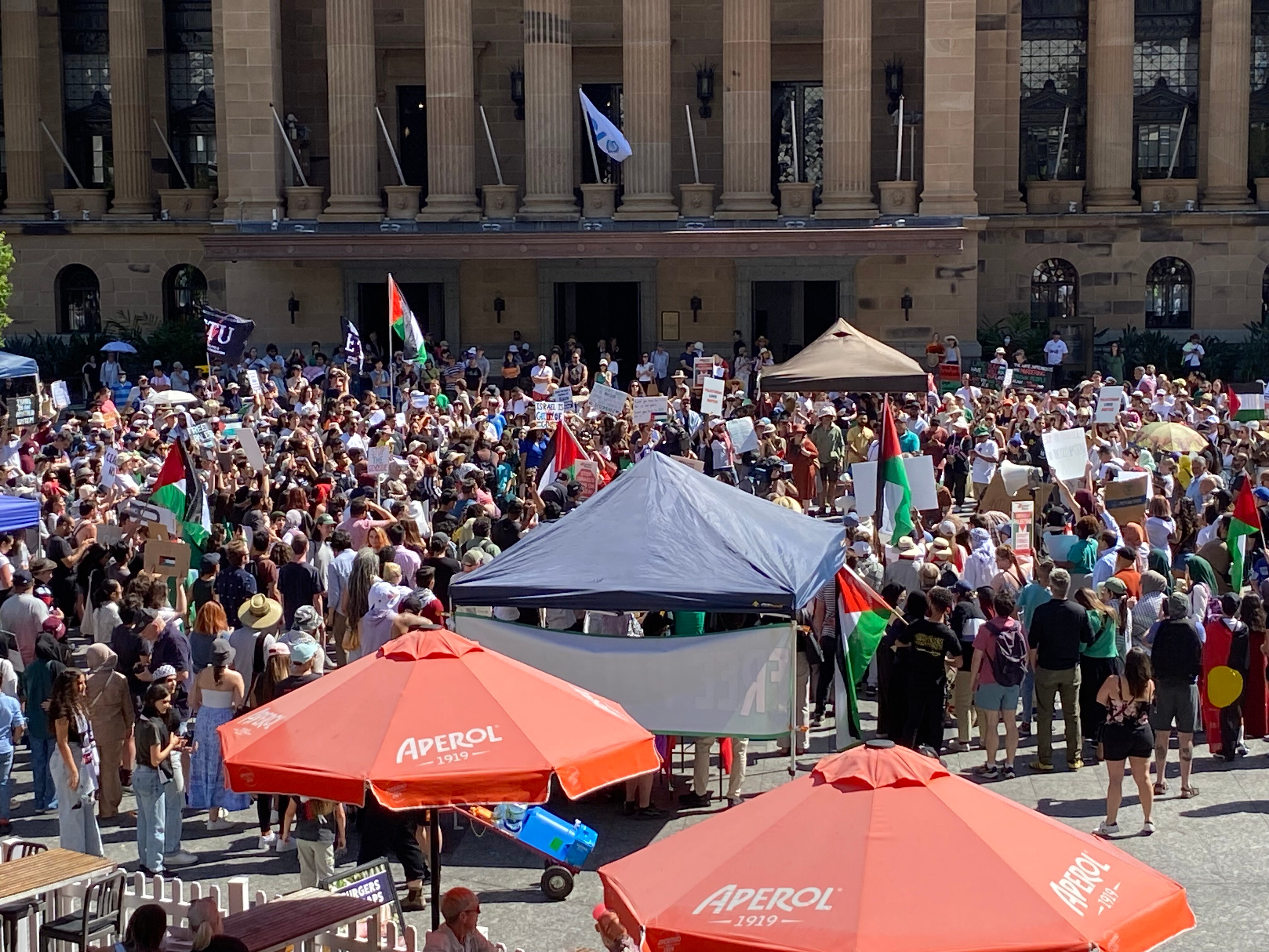 Colours of Palestinian flag fly over streets in Sydney, Brisbane and ...