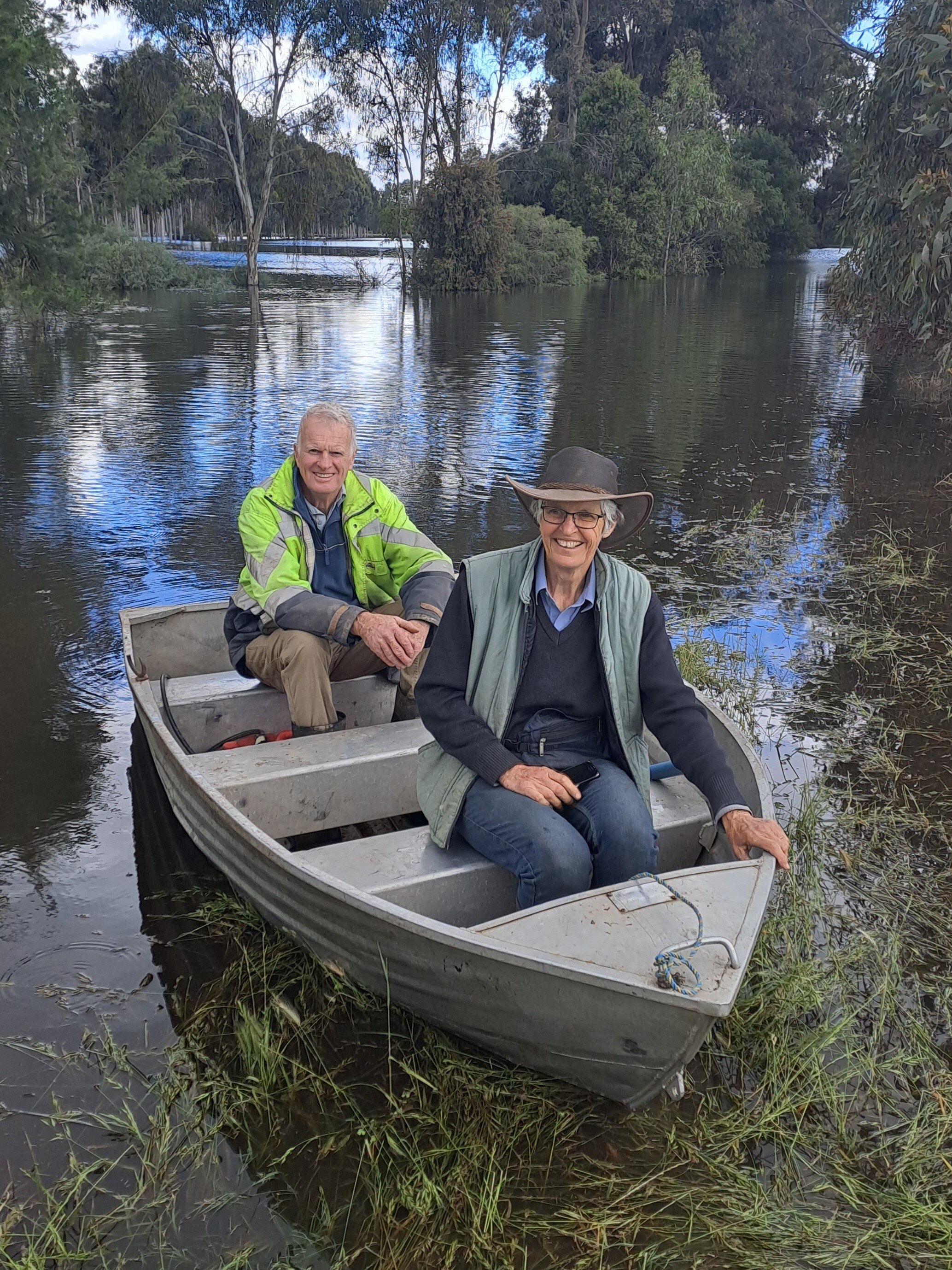Farmers swap tractors for boats to access properties along flooded ...