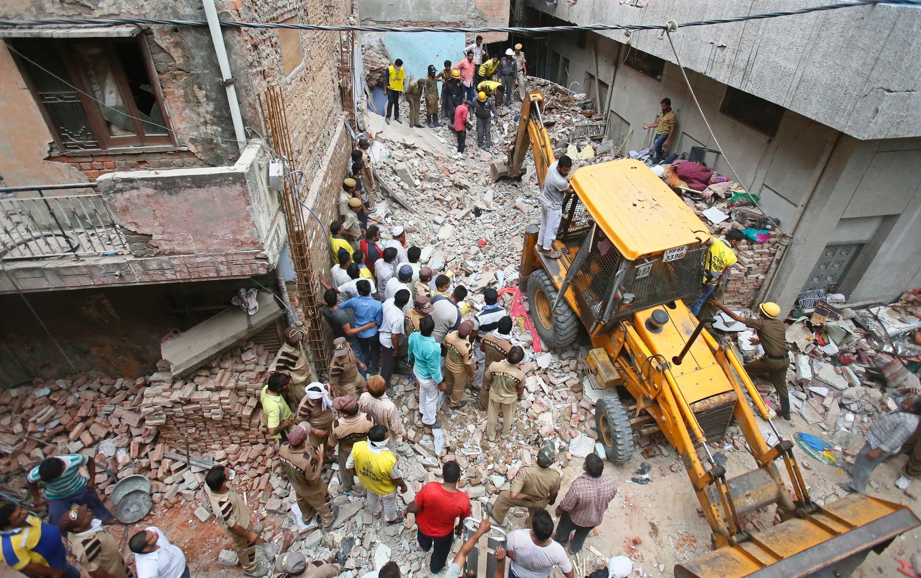 Building collapses kill 11 in India, dozens feared trapped - ABC News