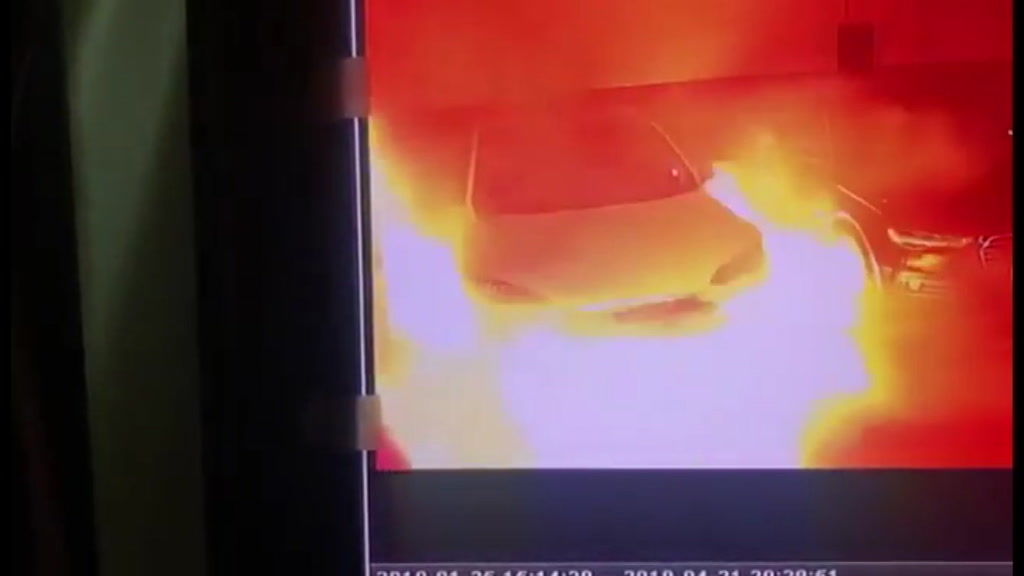 Tesla begins smoking before exploding into flames - ABC News