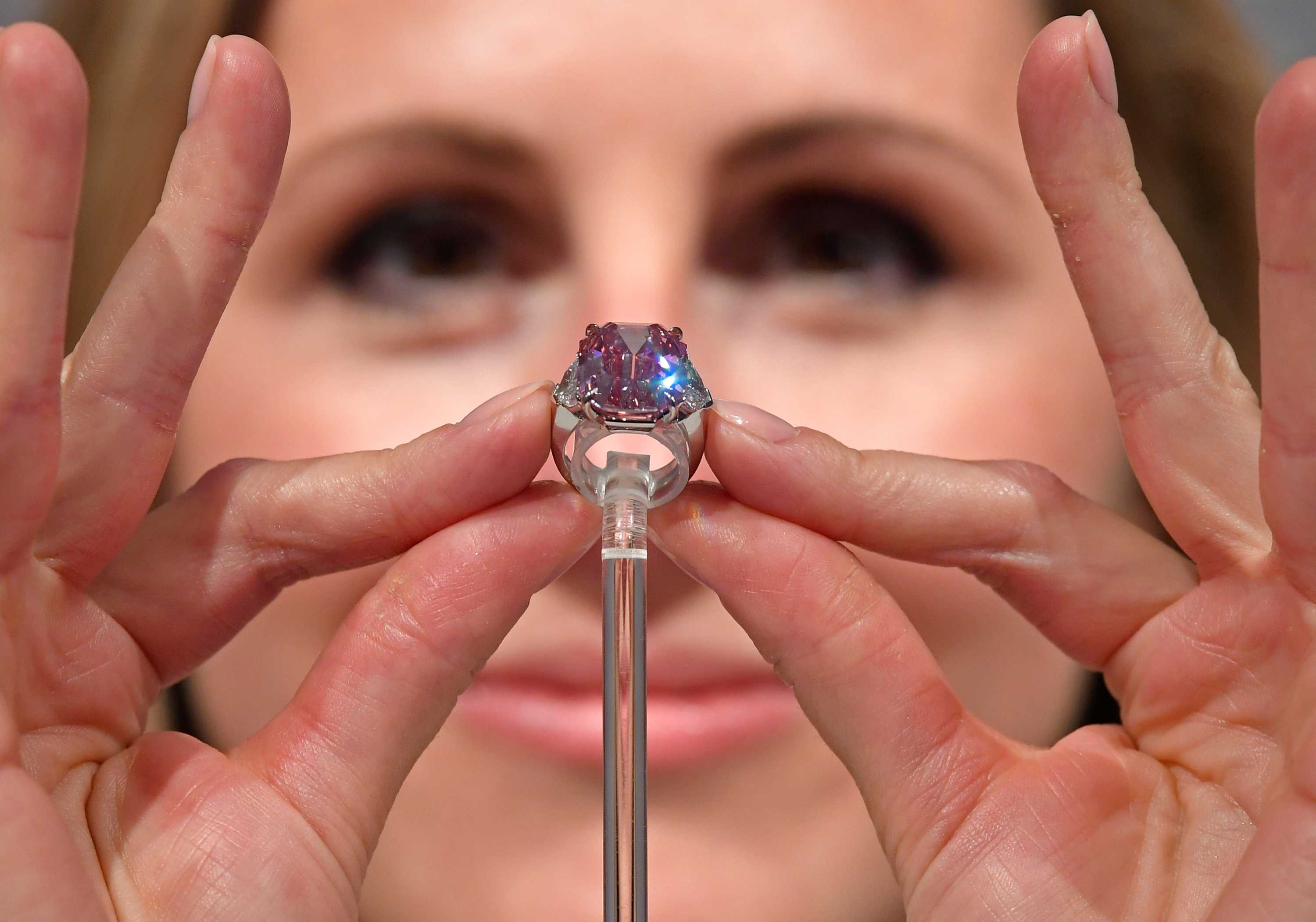 Pink Legacy diamond sells for almost $70 million, setting world record ...