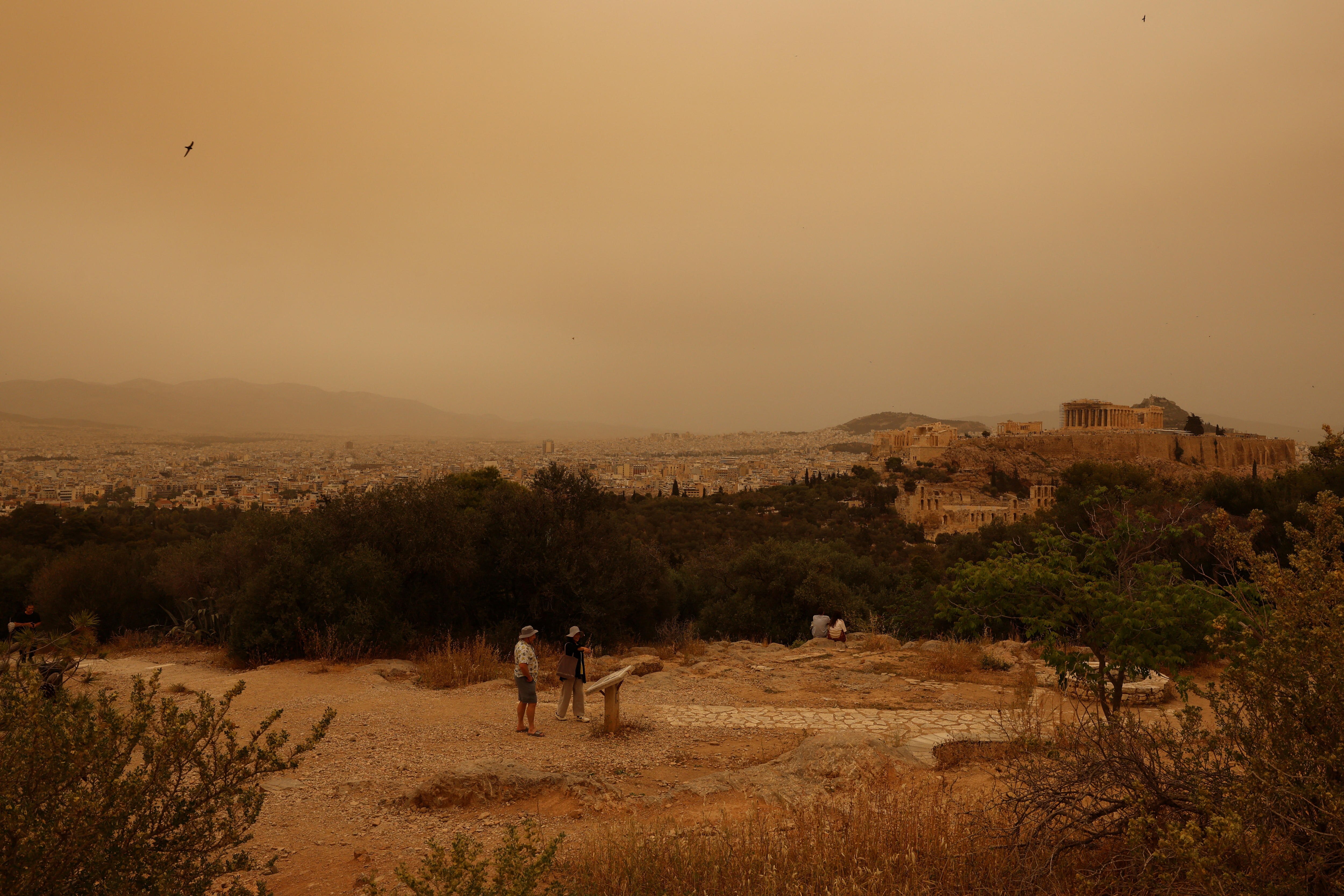 Skies over Athens, Greece, turn orange from Sahara dust storm - ABC News