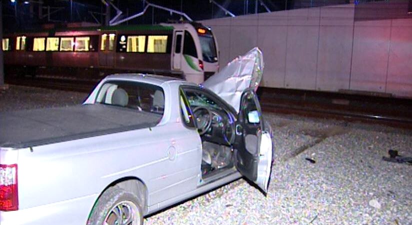 Close call as 'drunk driver' crashes ute on train tracks near Perth ...