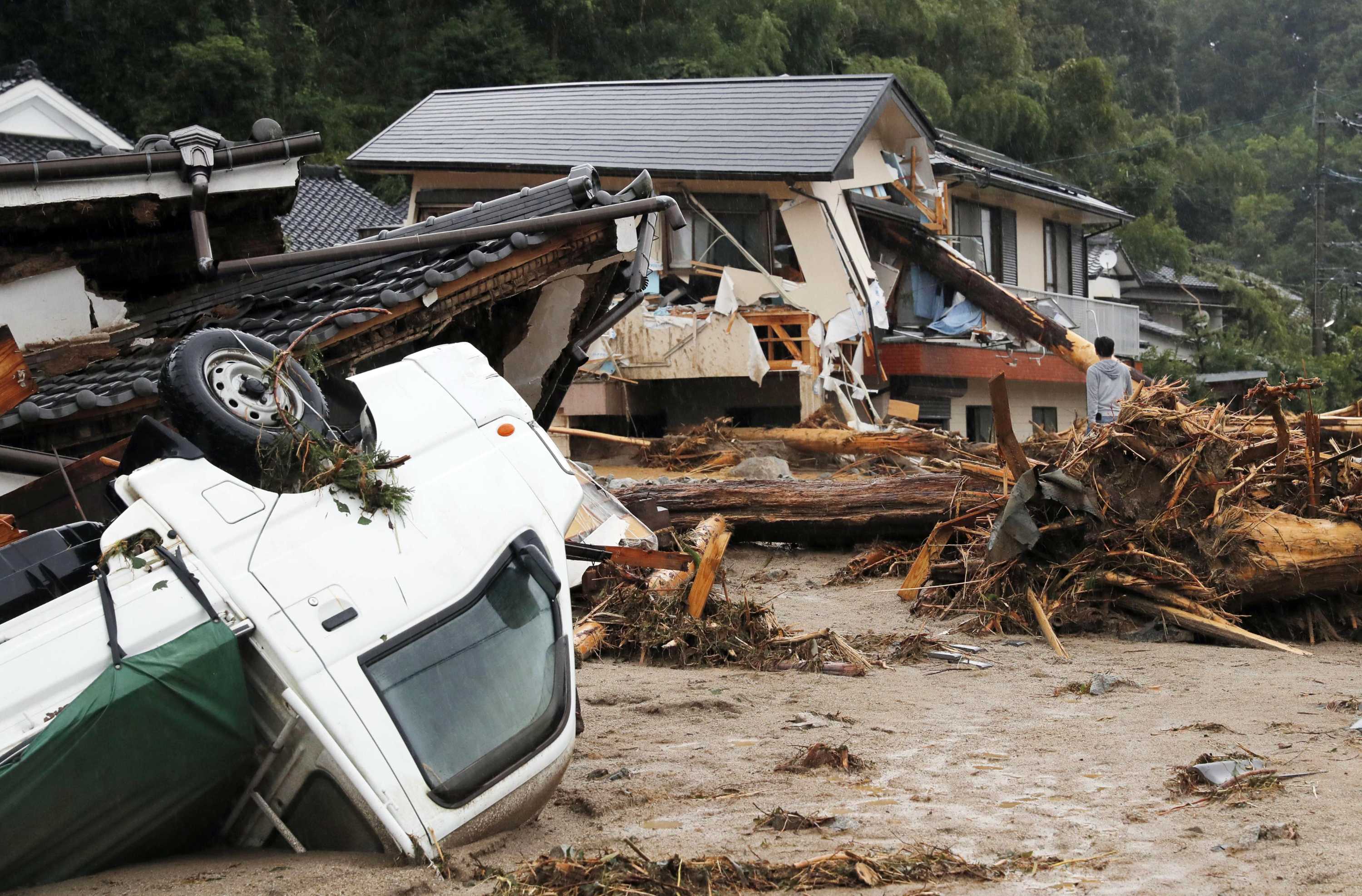 Japan floods: 11 missing, 500,000 to evacuate after days of torrential ...