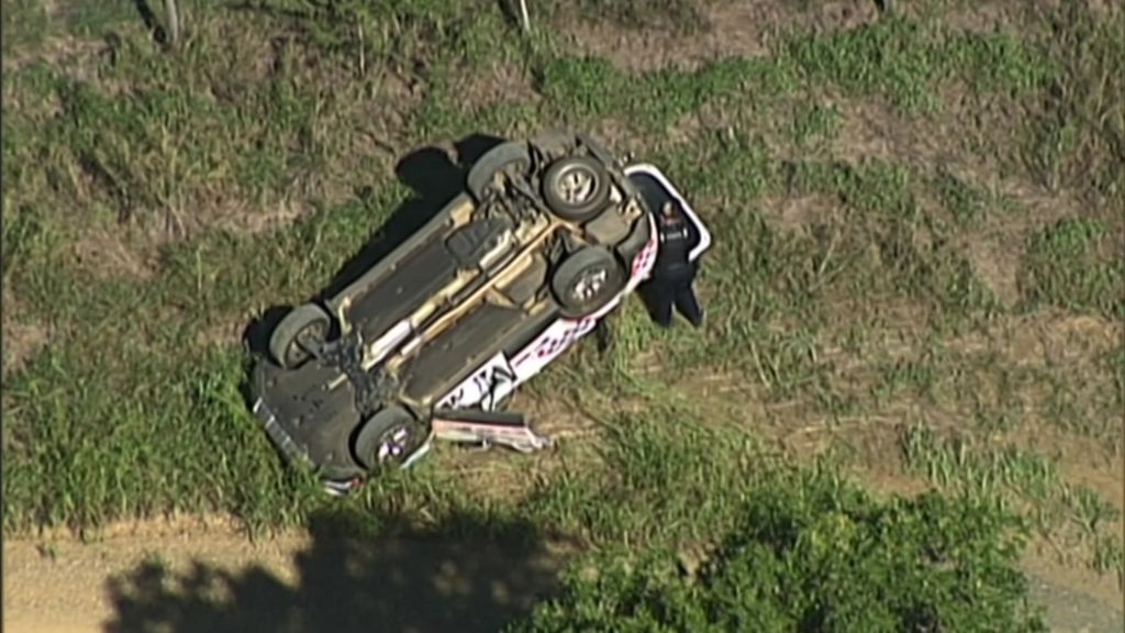 A police car flipped over while rushing to the scene - ABC News