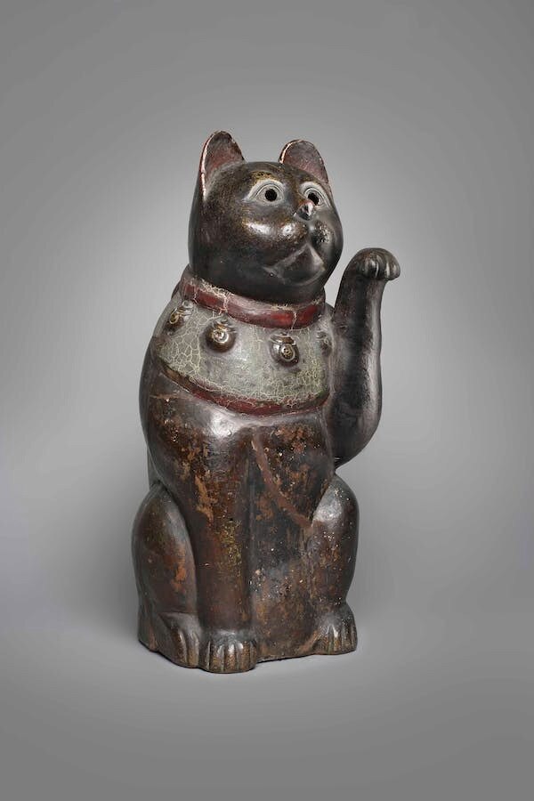 What is the story of maneki-neko, the Japanese beckoning cat? - ABC News