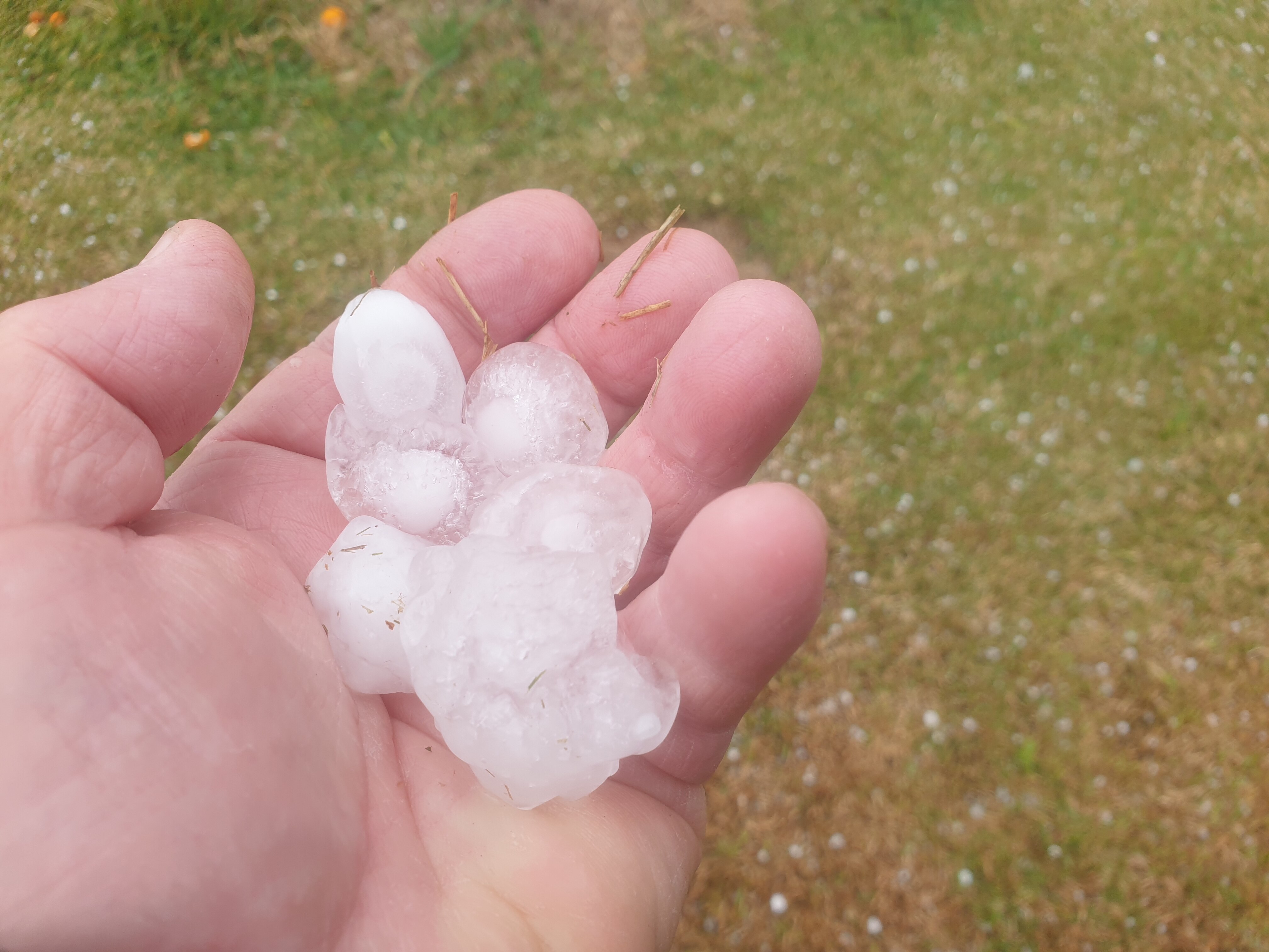 Large hail and lightning strikes as storm front moves across north-west ...
