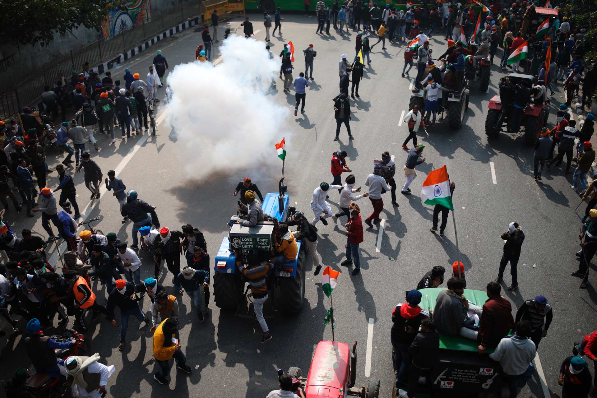 Tractors fill streets of New Delhi as farmers' protests interrupt ...