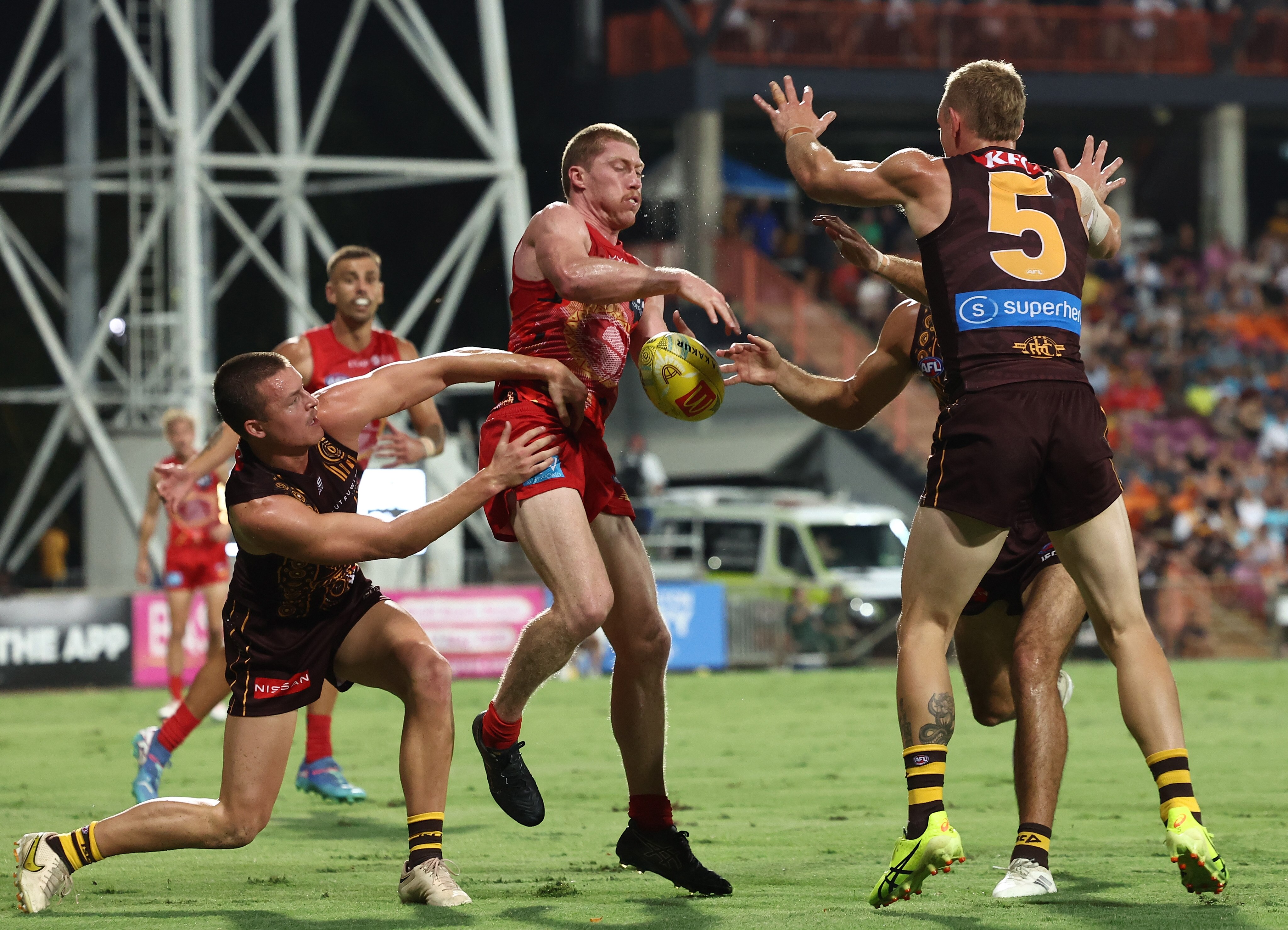 Gold Coast holds off Hawthorn by eight points as Suns keep remarkable ...