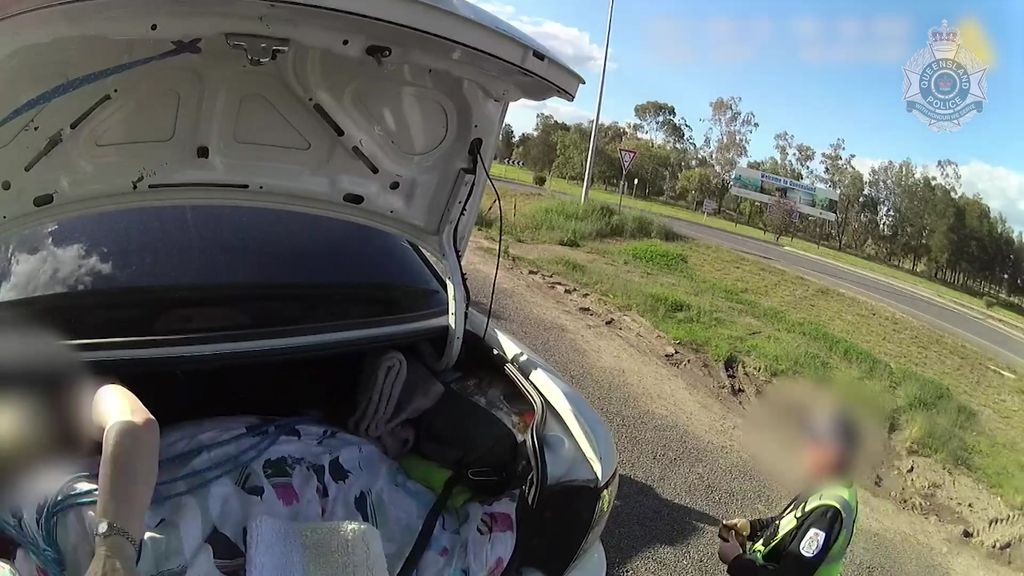 Woman caught in car boot at Queensland border - ABC News