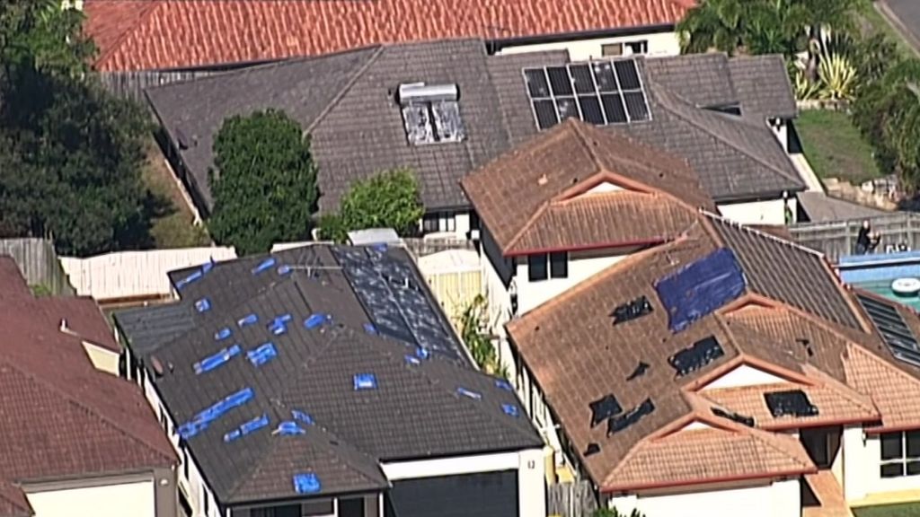 Damage after giant hail smashes homes at Springfield, west of Brisbane ...