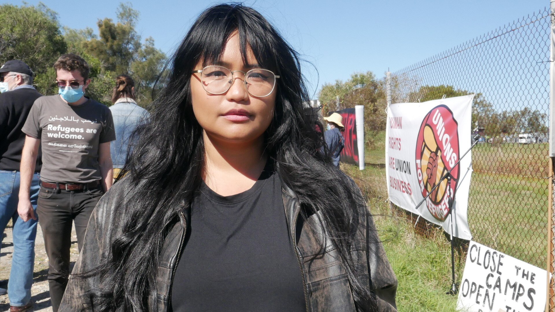Refugee advocates protest outside Brisbane immigration centre to mark ...