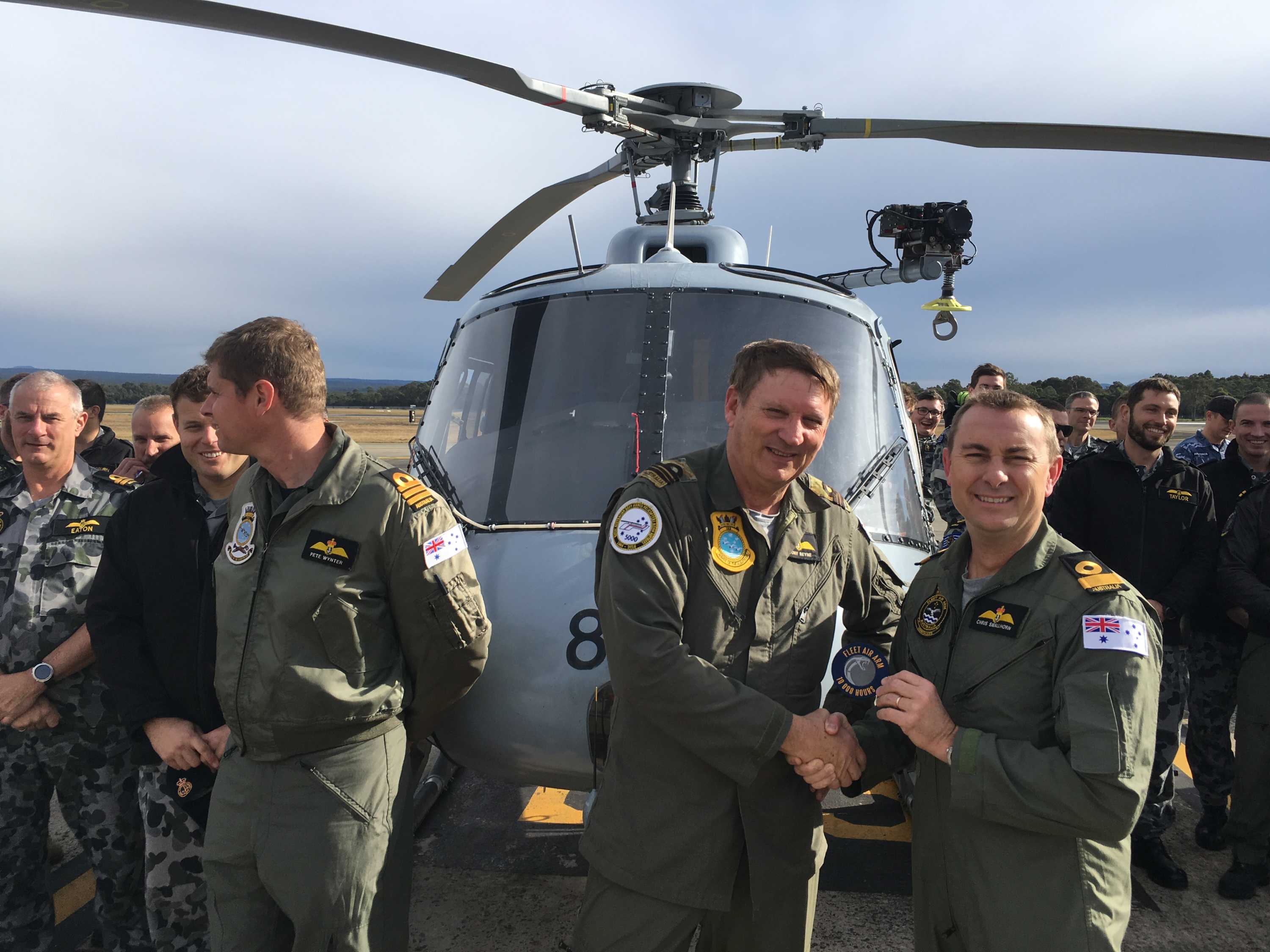 Australian Navy helicopter pilot clocks up record 10,000 hours in air ...