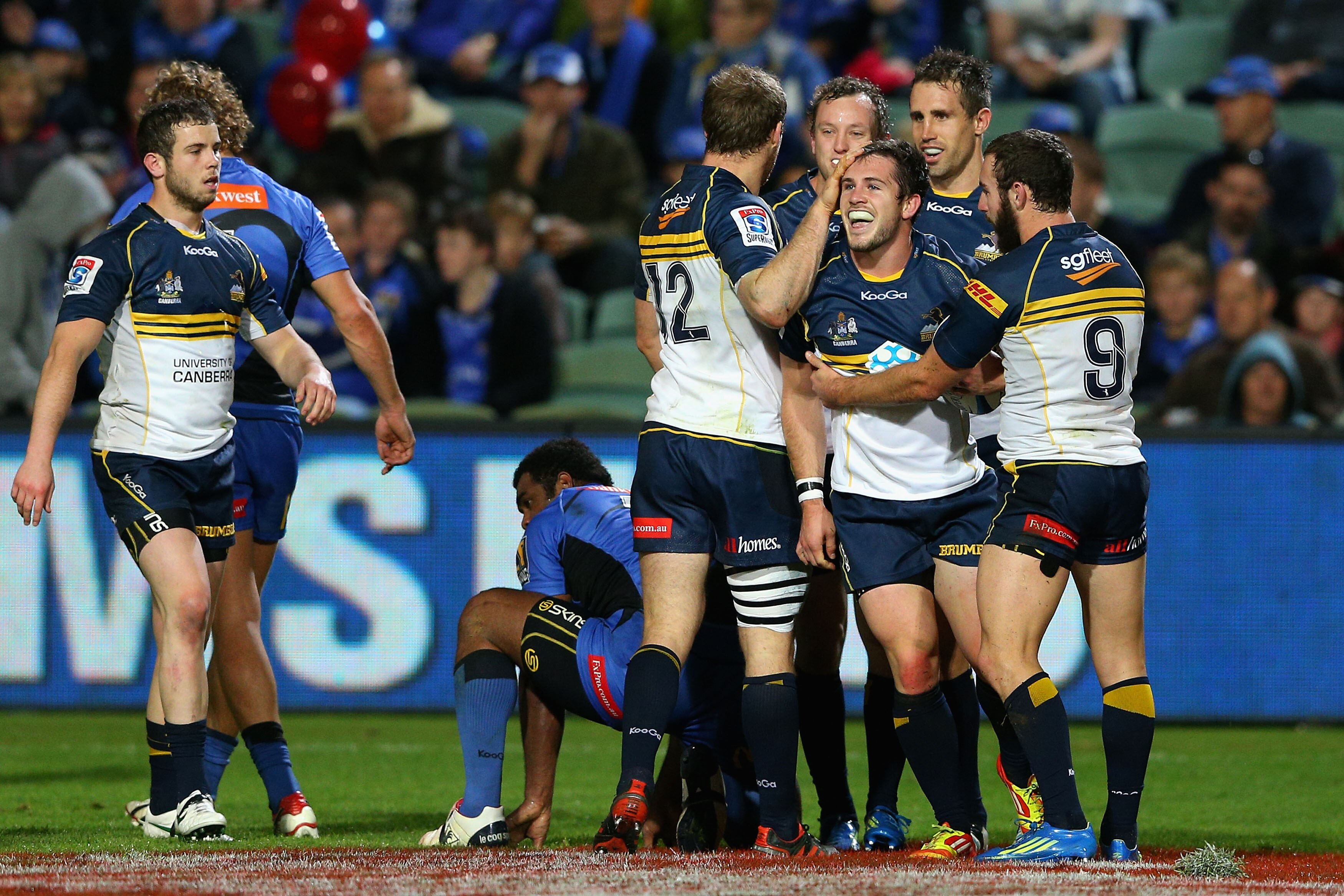 Brumbies stay ahead of Reds - ABC News